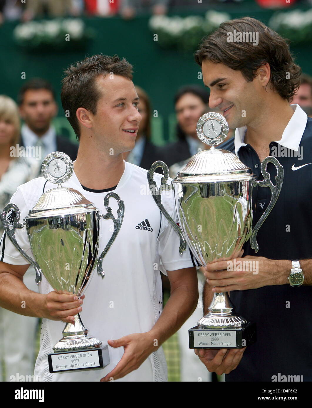 Tennis players Roger Federer from Switzerland (R) and Philipp ...