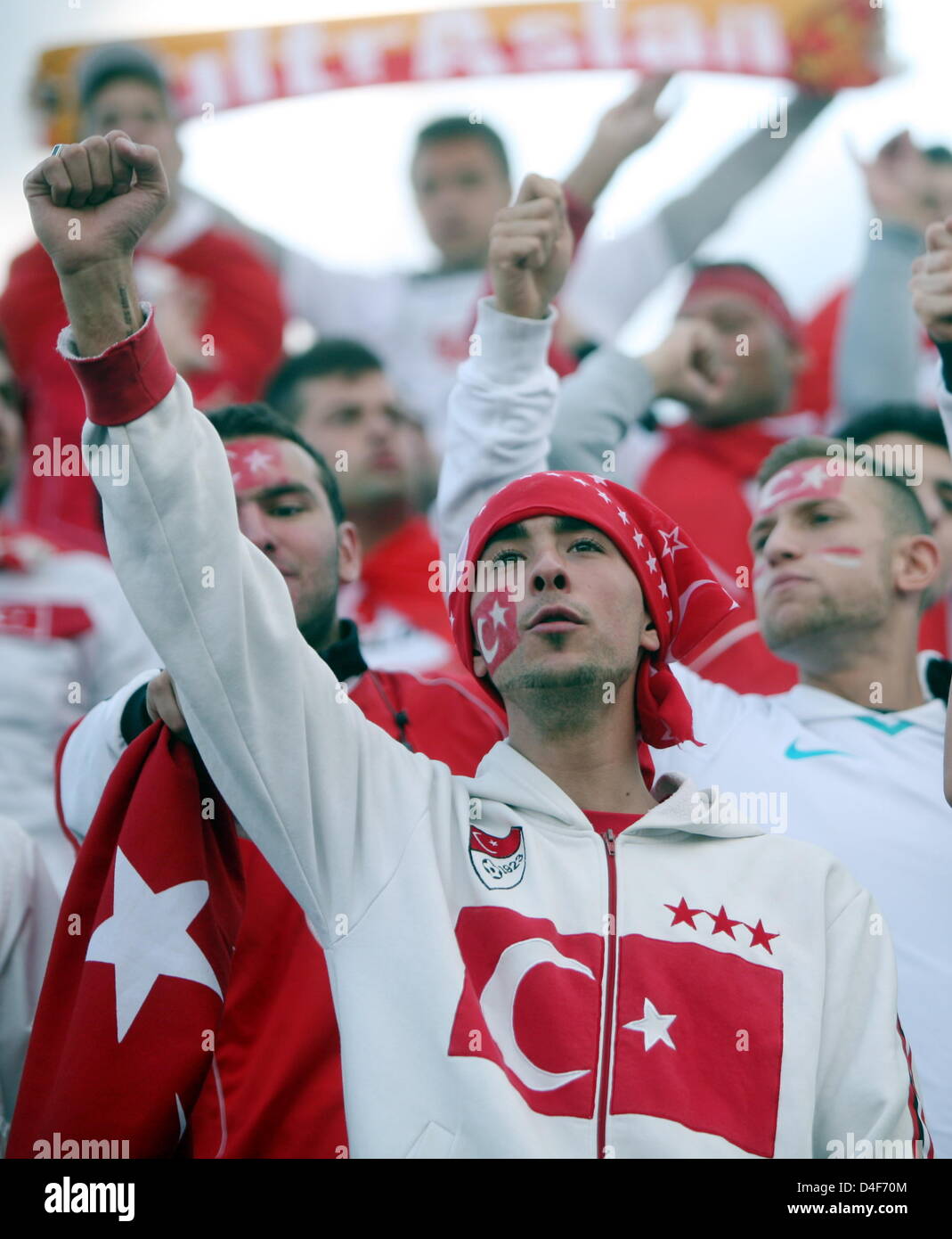 Turkish fans are pictured in front of a video screen prior to the last ...