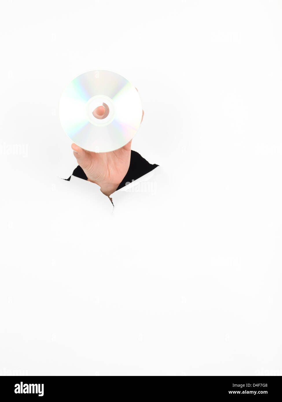 Hand holding up dvd cd Cut Out Stock Images & Pictures - Alamy