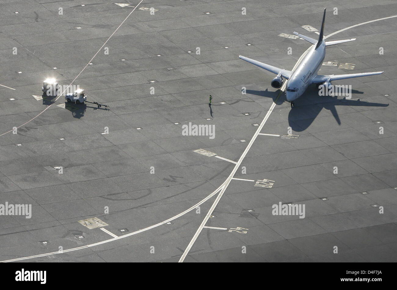 Aerial view on a runway with a Boeing 737-300 at the airport Hanover ...
