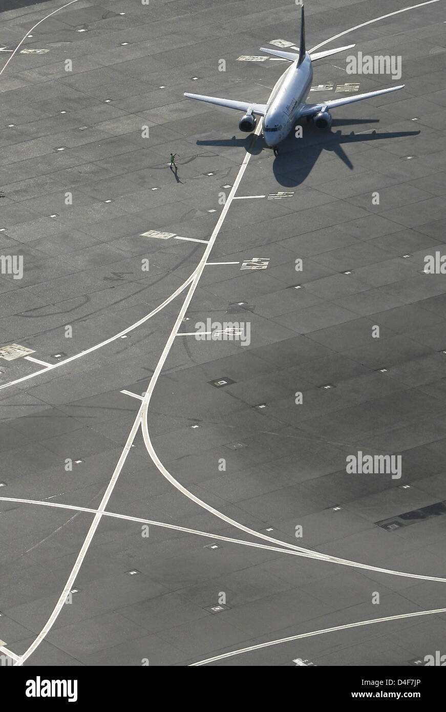 Aerial view on a runway with a Boeing 737-300 at the airport Hanover ...