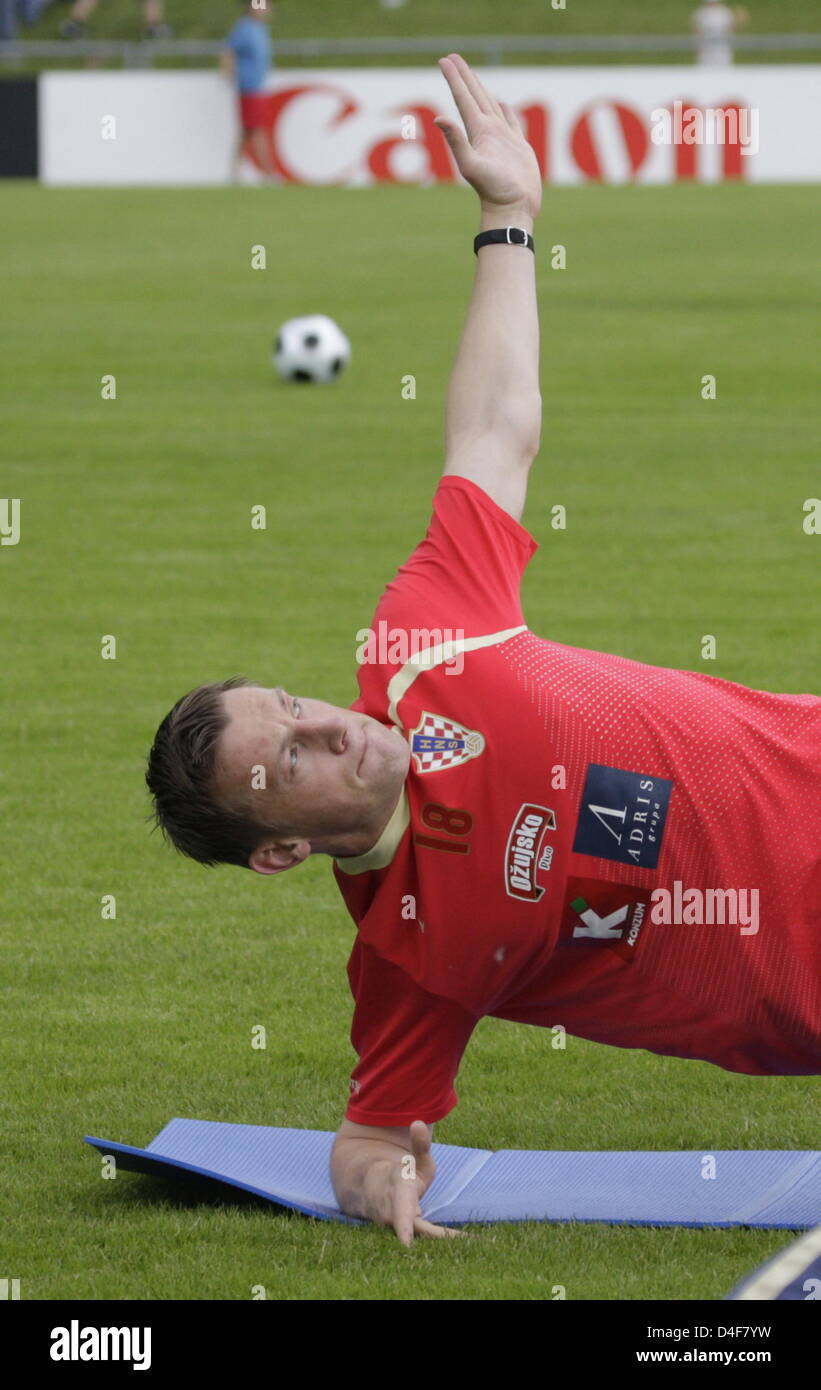 Ivica Olic of Croatia stretches during a training session at the team's ...