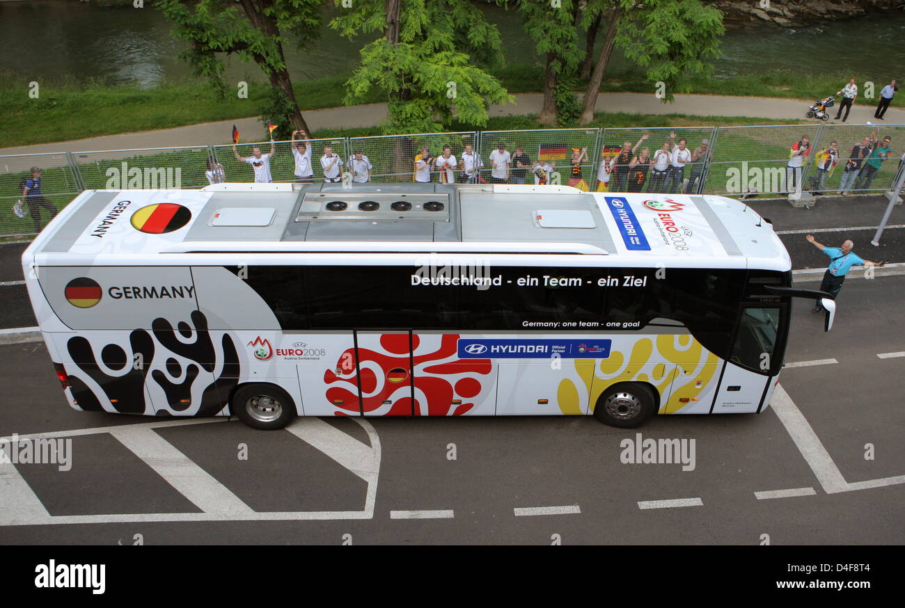 Supporters of Germany cheer to the arriving German team bus prior to ...