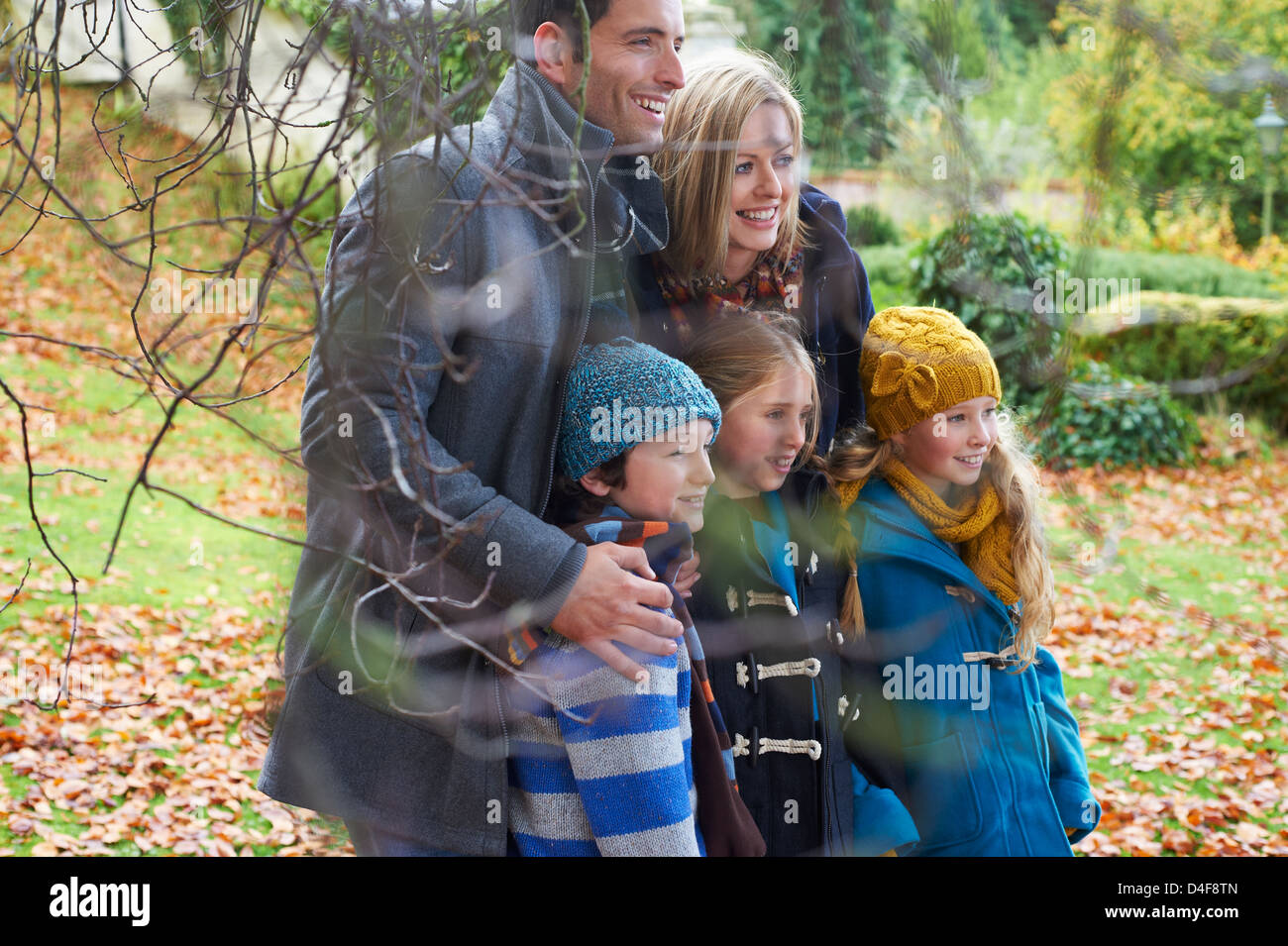 Family smiling together outdoors Stock Photo - Alamy