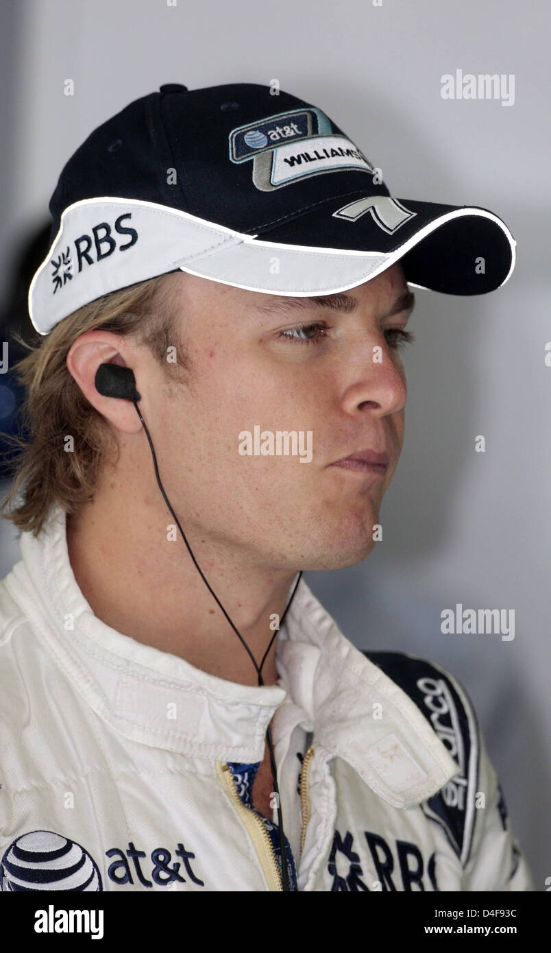 German Formula One driver Nico Rosberg stands in his pit during the ...