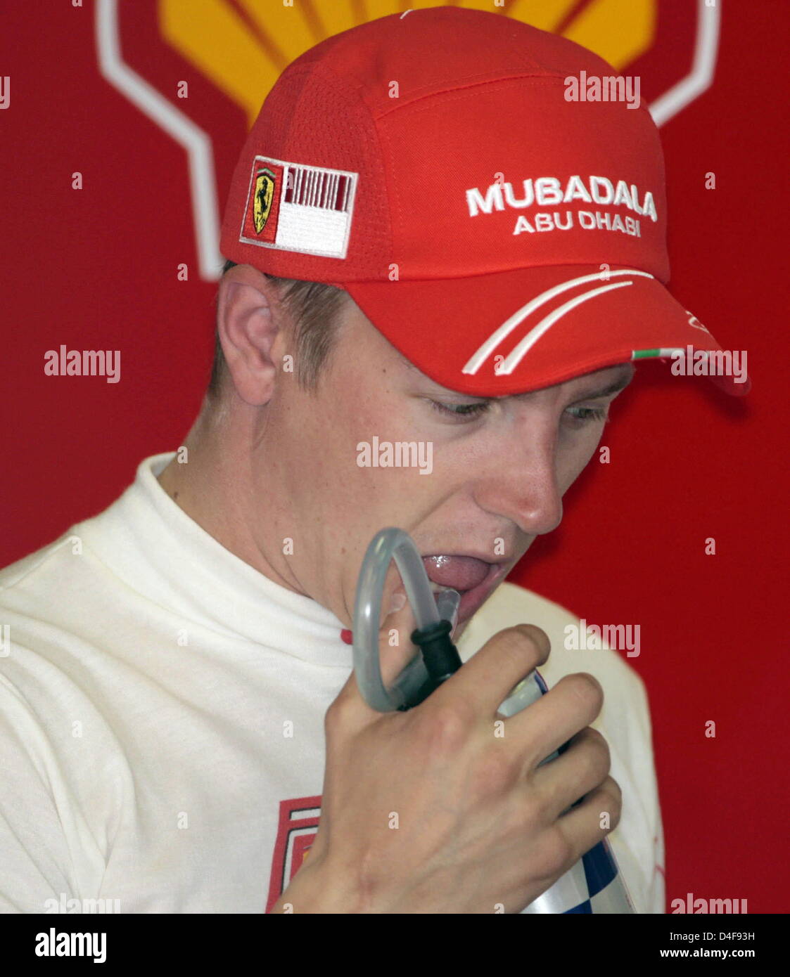 Finnish Formula One driver Kimi Raikkonen of Ferrari stands in his pit ...