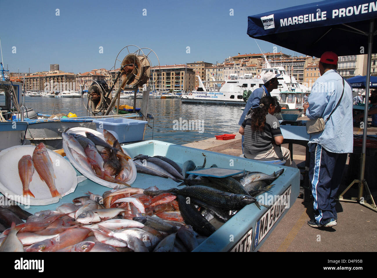 Vendors pictured at the fish market of the Old Harbour in Marseille ...