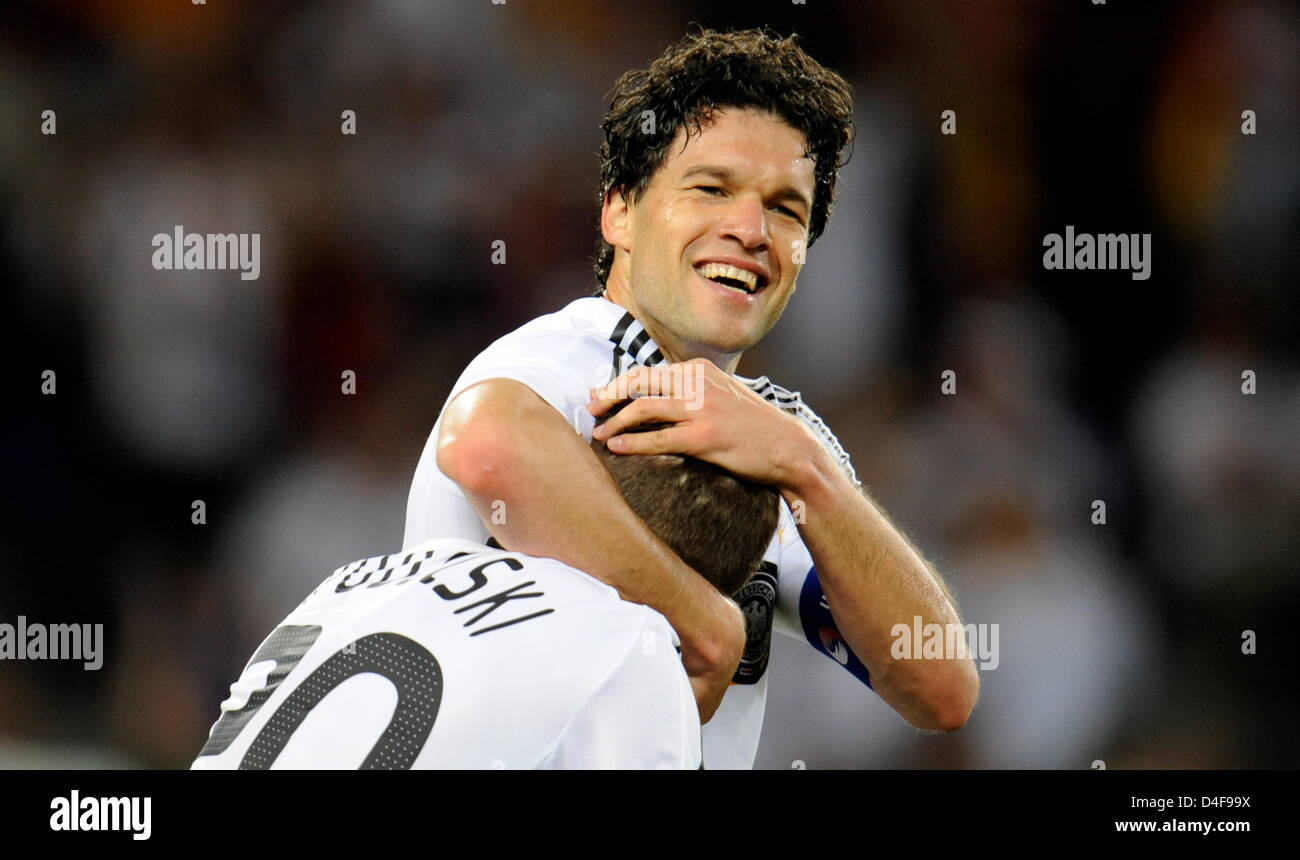 German team captain Michael Ballack (back) celebrates with teammate ...