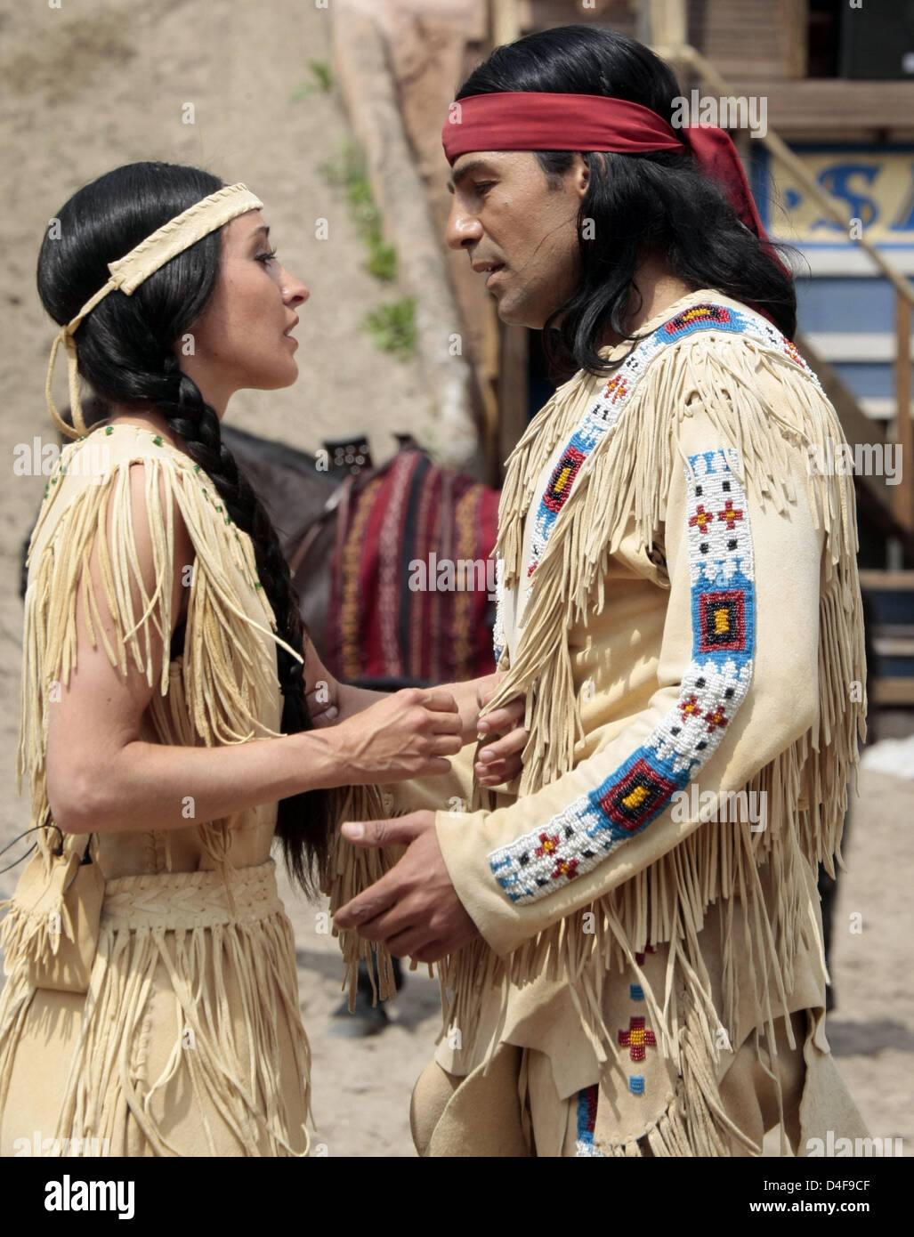 Erol Sander as Winnetou (R) and Maike von Bremen as Ribana (L) rehearse ...