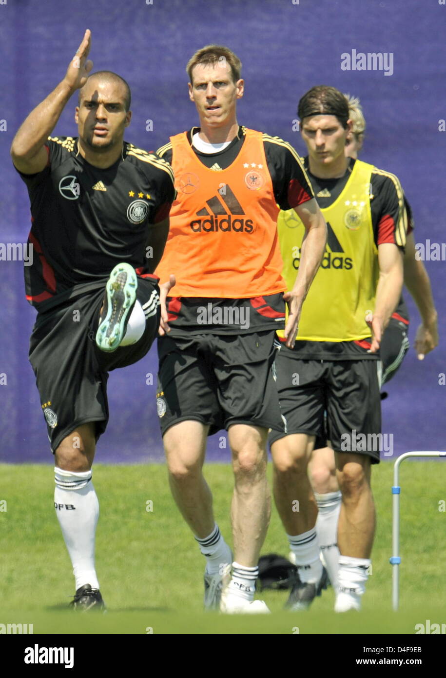 David Odonkor (L-R), Tim Borowski, and Mario Gomez of Germany during ...