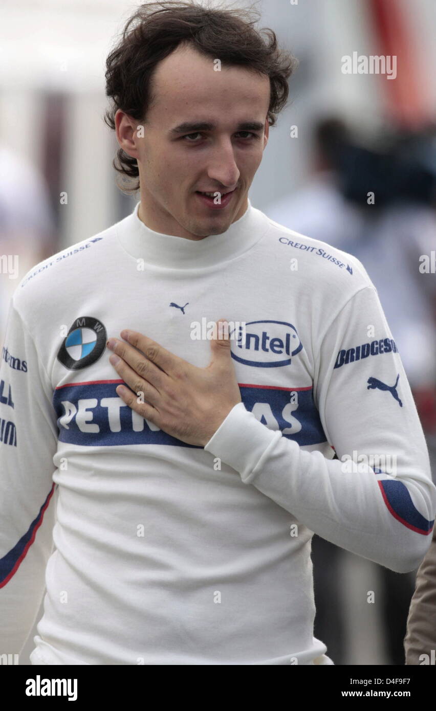 Polish Formula One driver Robert Kubica of BMW Sauber on the way to the ...