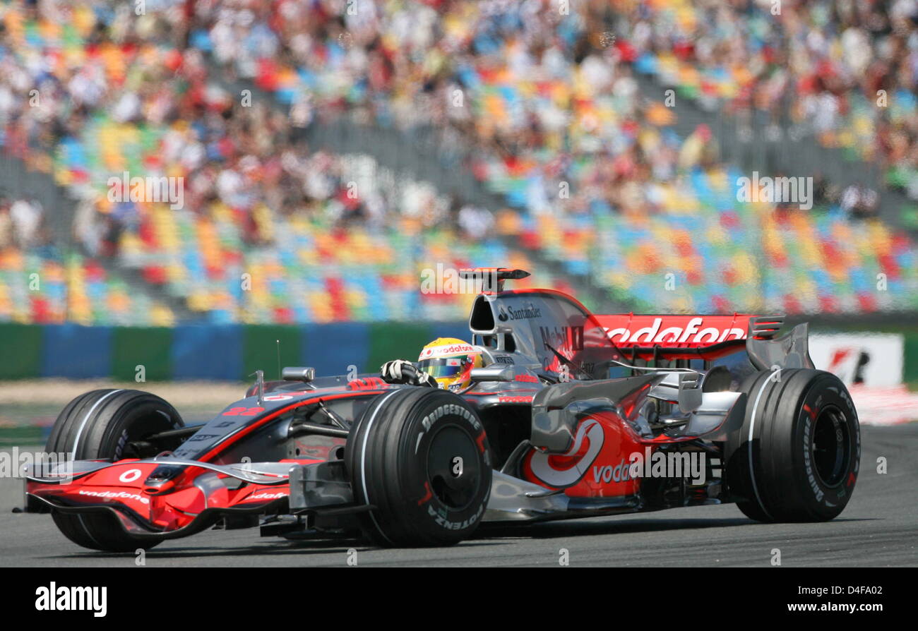 British Formula One driver Lewis Hamilton of McLaren Mercedes steers ...
