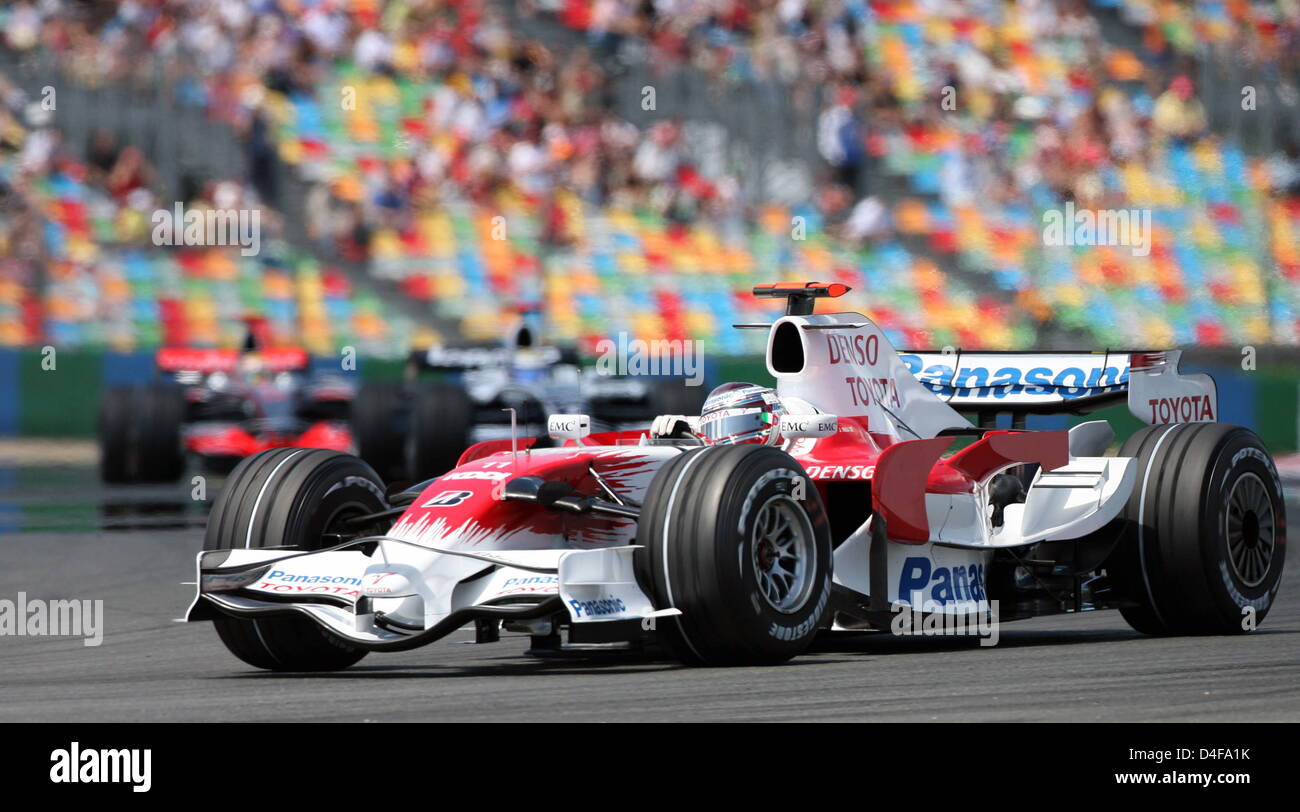 Italian Formula One driver Jarno Trulli of Toyota steers his car ...