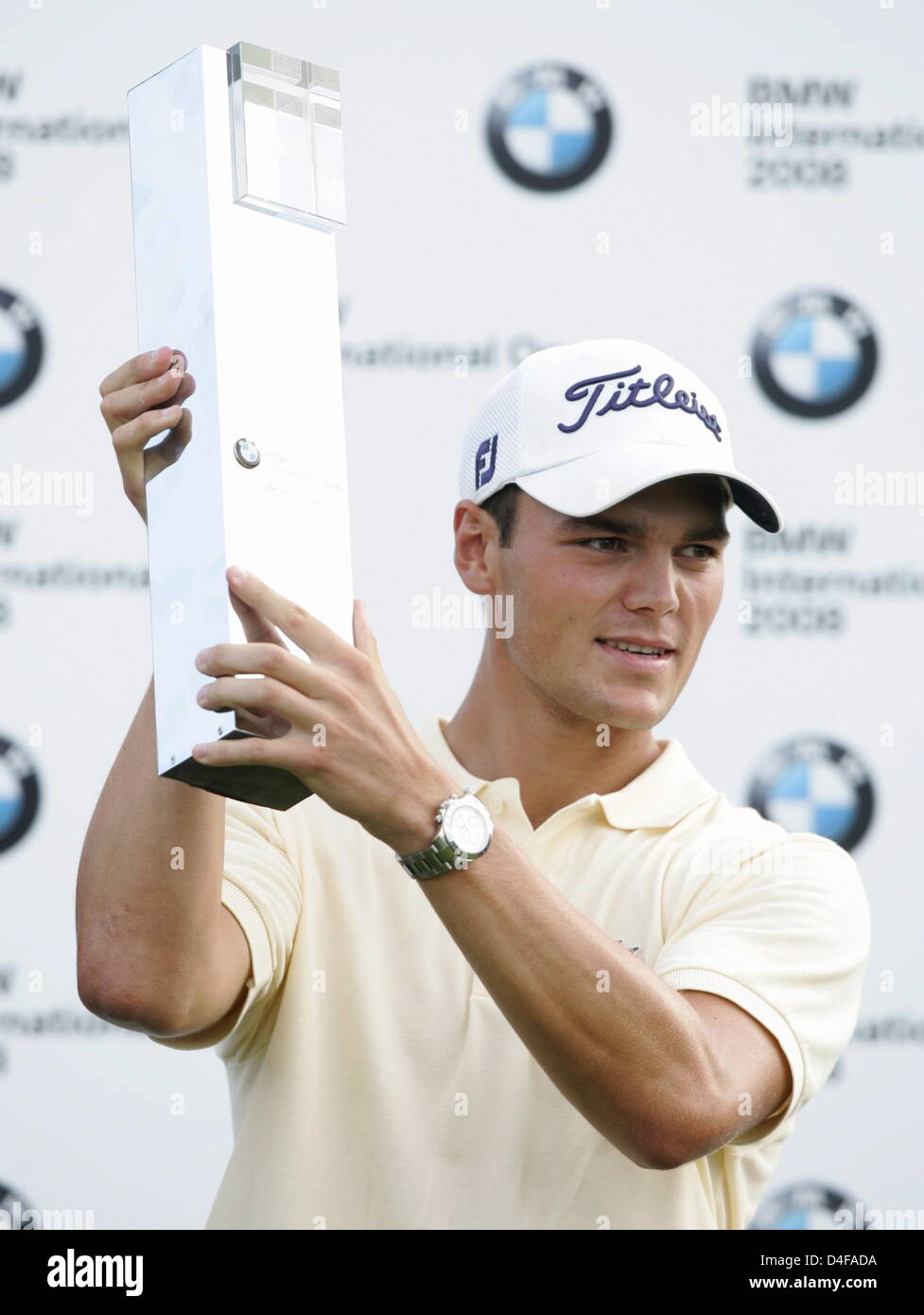 German Martin Kaymer presents his trophy during the award ceremony of ...