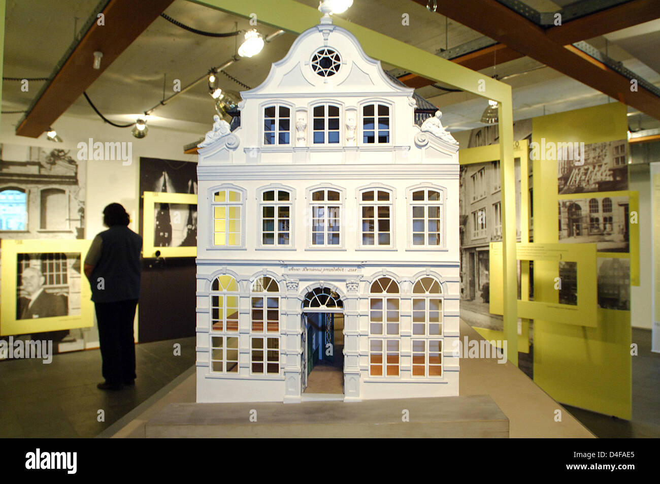 A model of the Buddenbrook house is pictured in front of a Thomas Mann ...