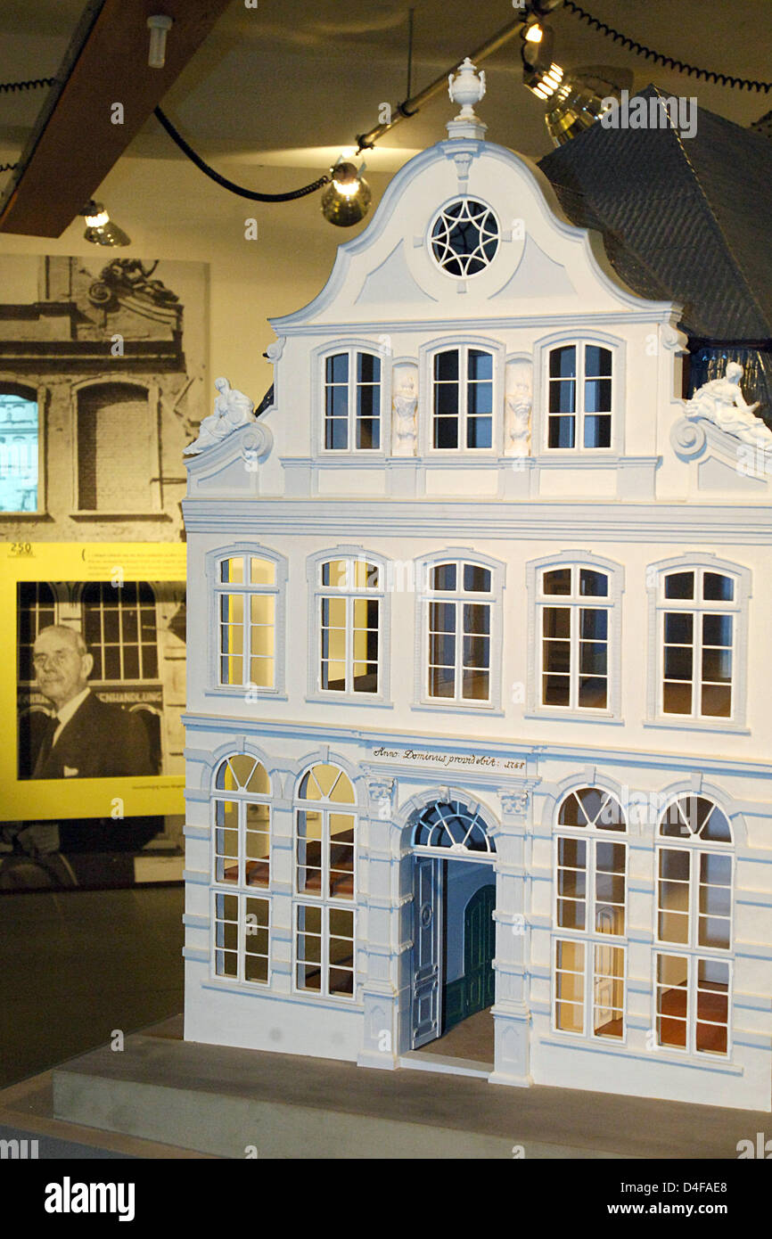 A model of the Buddenbrook house is pictured in front of a Thomas Mann ...