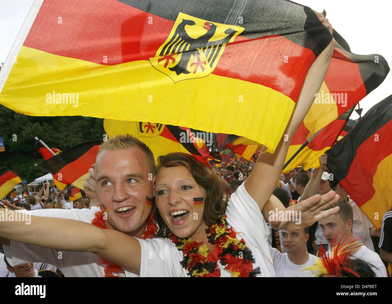 German soccer fans get ready for the UEFA EURO 2008 semi-final match ...