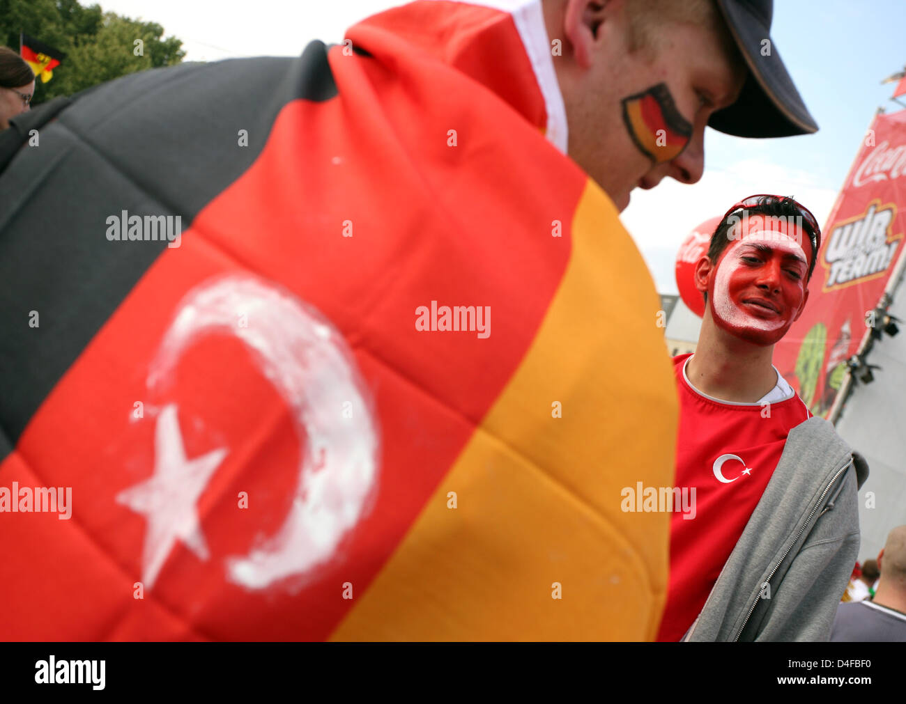 German and Turkish soccer fans get ready for the UEFA EURO 2008 semi ...