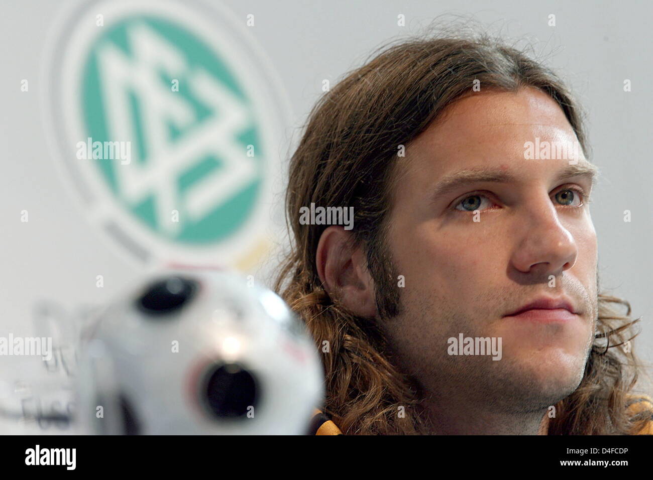 Germany's Torsten Frings talks to the media during a press conference ...