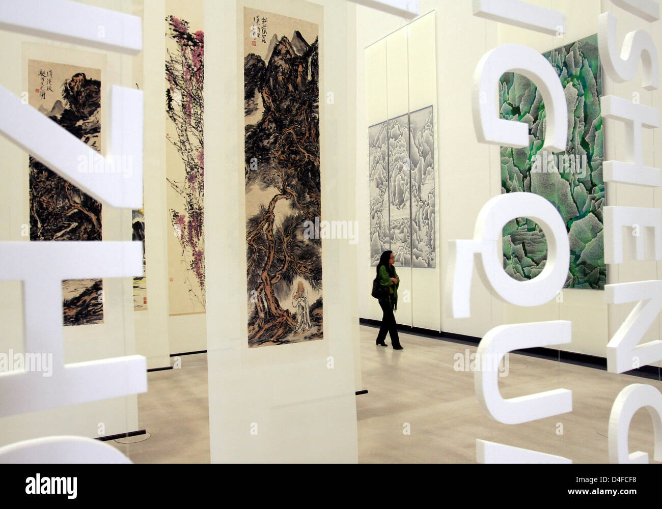Chinese visitors to the exhibition 'The Transforming Marks of Ink' eye ...