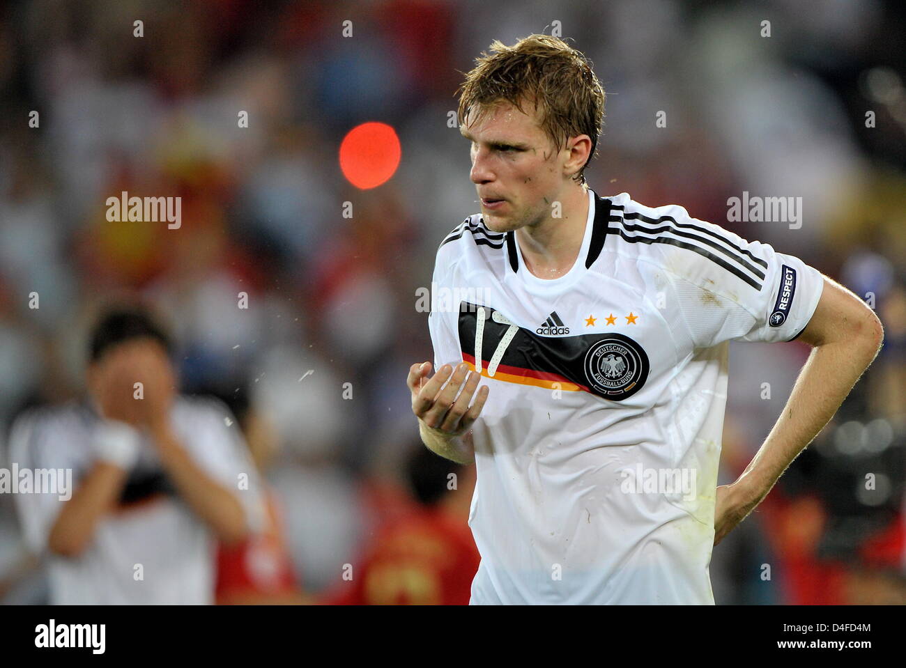 Per Mertesacker of Germany stands on the pitch after the UEFA EURO 2008 ...