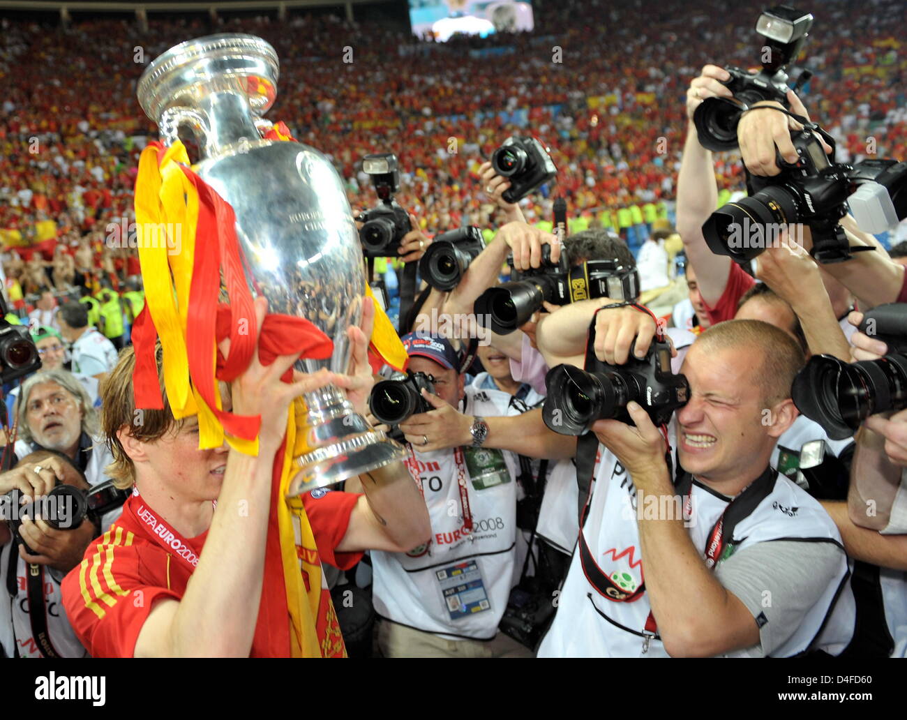 Fernando Torres of Spain jubilates with the cup after the UEFA EURO ...