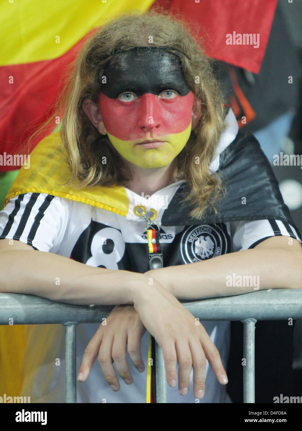 A supporter of Germany looks dejected after the UEFA EURO 2008 final ...