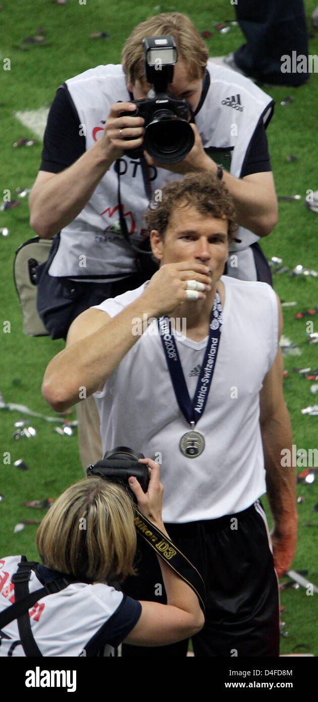Goalkeeper Jens Lehmann of Germany leaves the pitch waving to the crowd ...