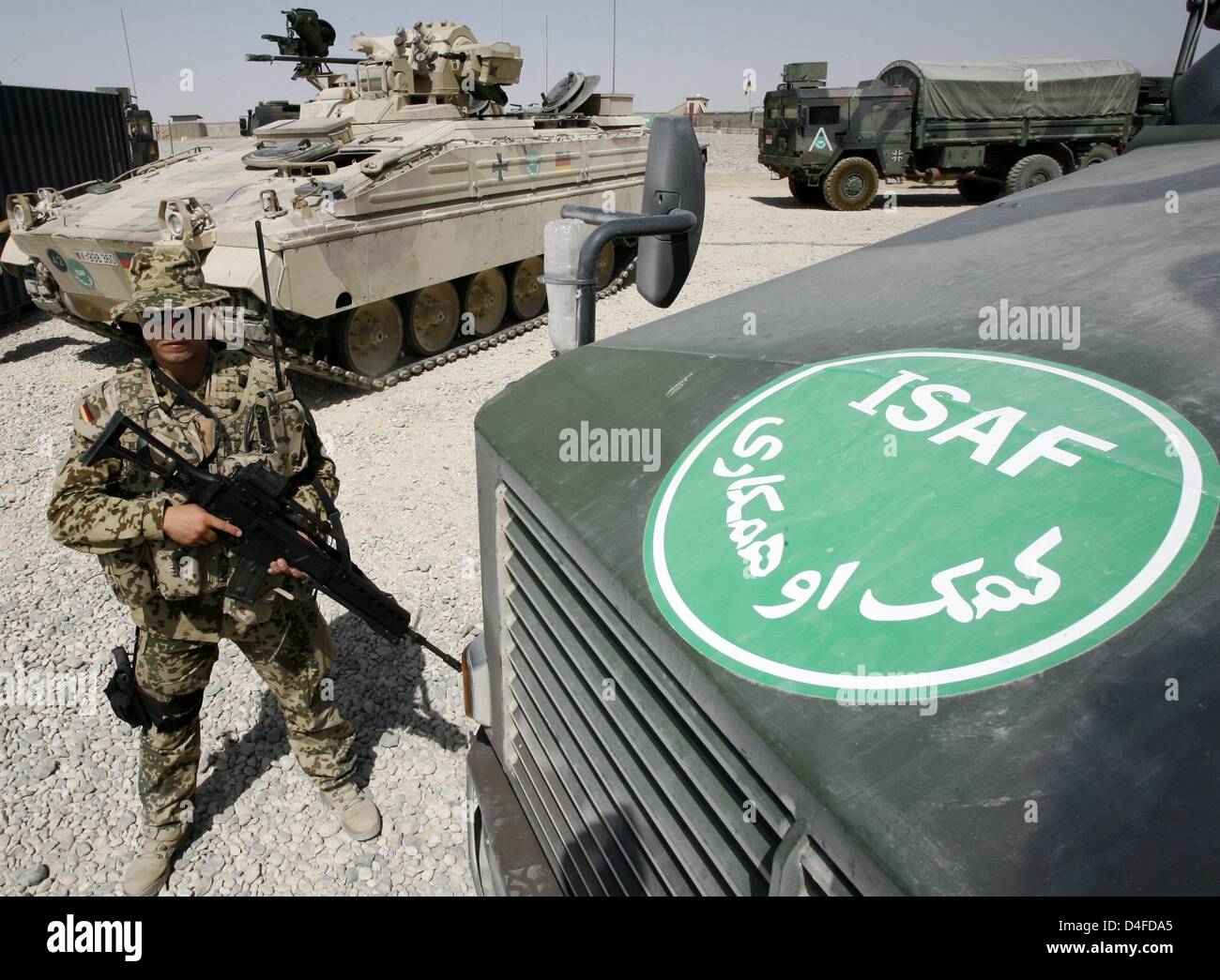A German Quick Reaction Force (QRF) soldier poses in front of an ...