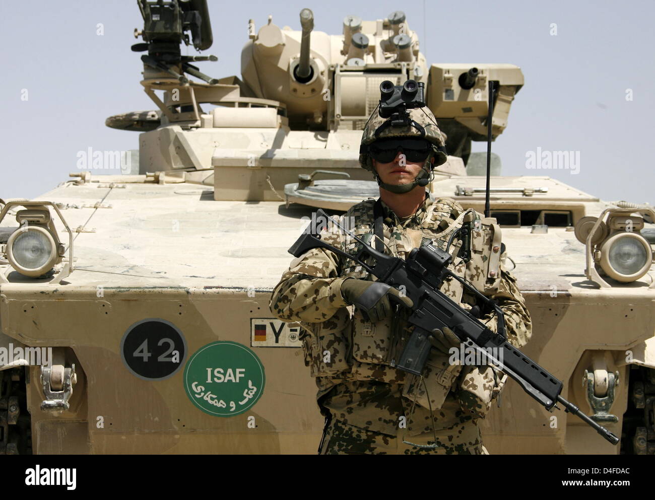A German Quick Reaction Force (QRF) soldier poses in front of an ...