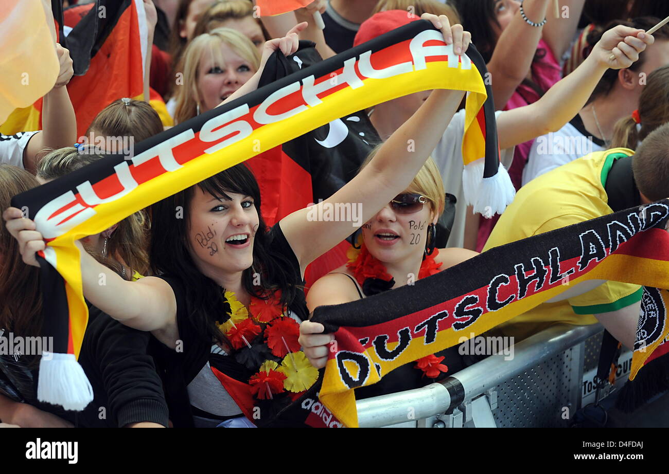 German soccer fans celebrate on the streets near Brandenburg Gate in ...