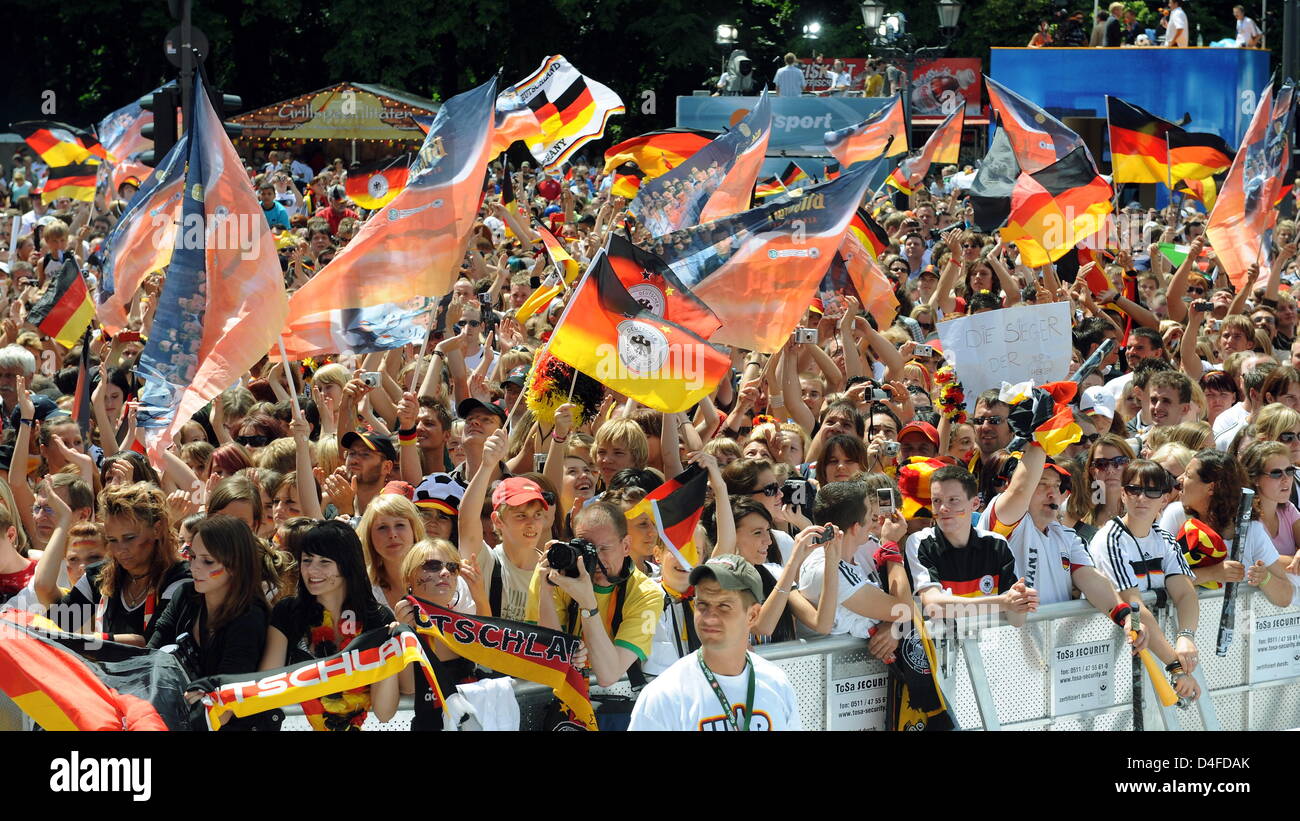 German soccer fans celebrate on the streets near Brandenburg Gate in ...