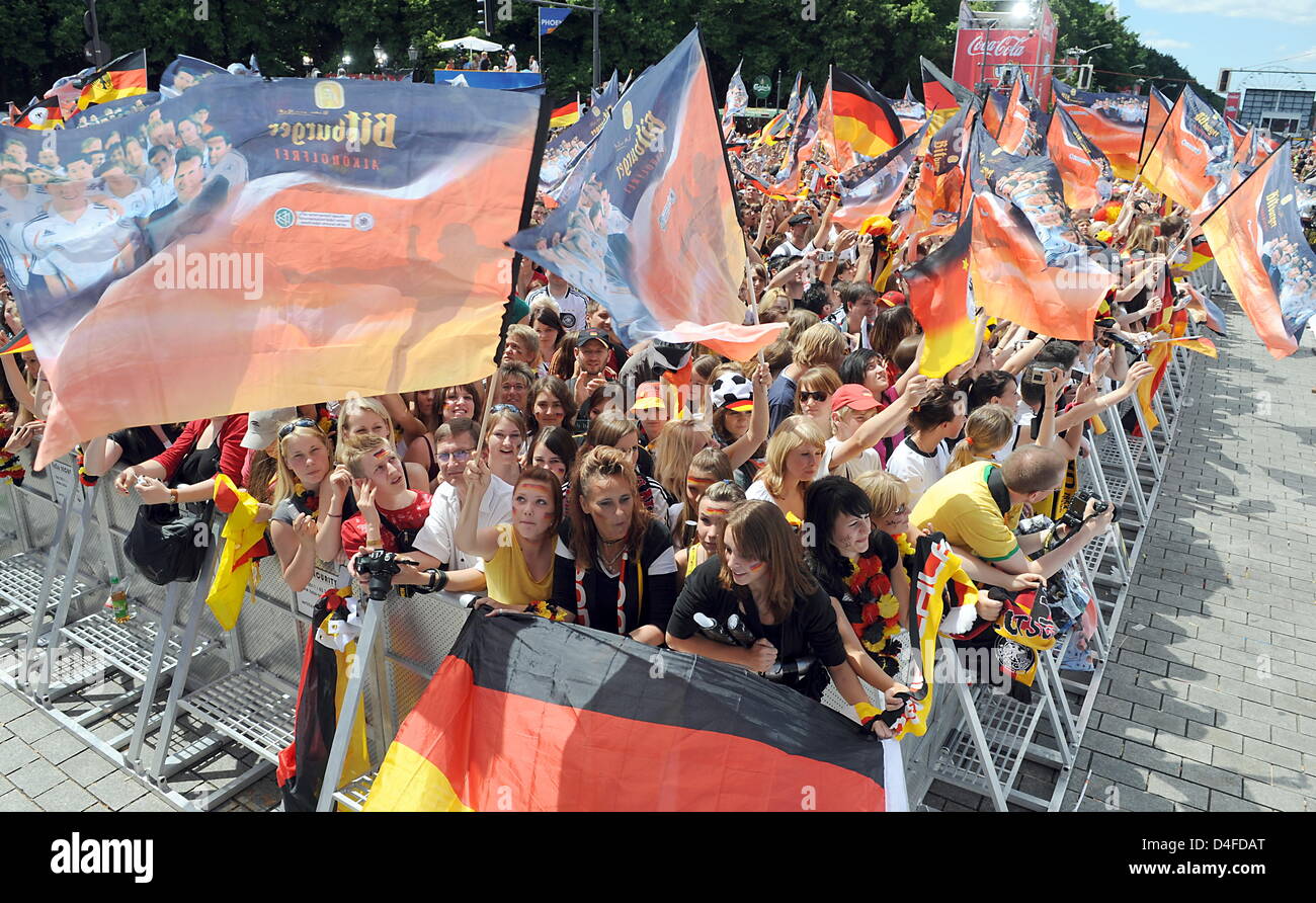German soccer fans celebrate on the streets near Brandenburg Gate in ...