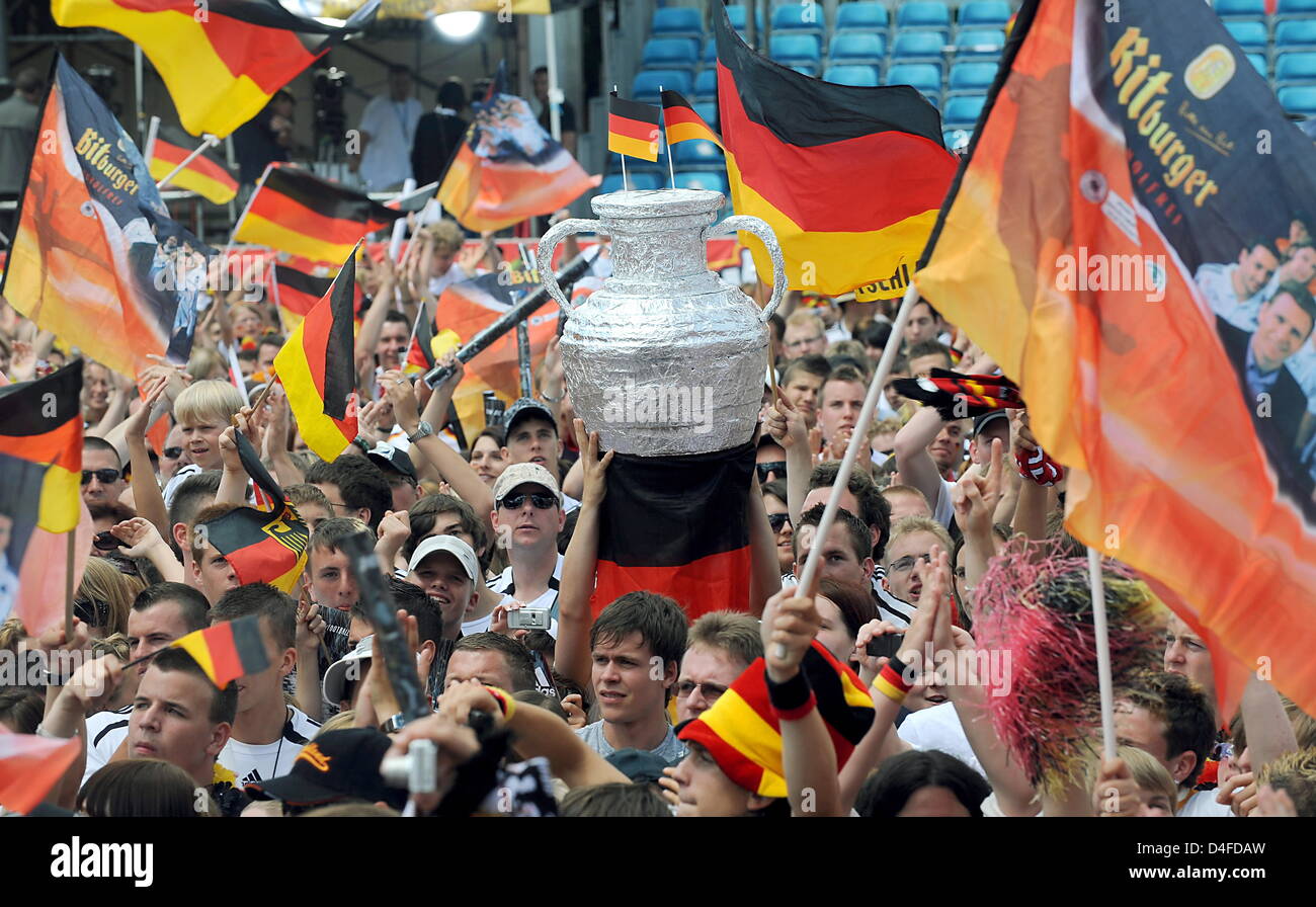 German soccer fans celebrate on the streets near Brandenburg Gate in ...