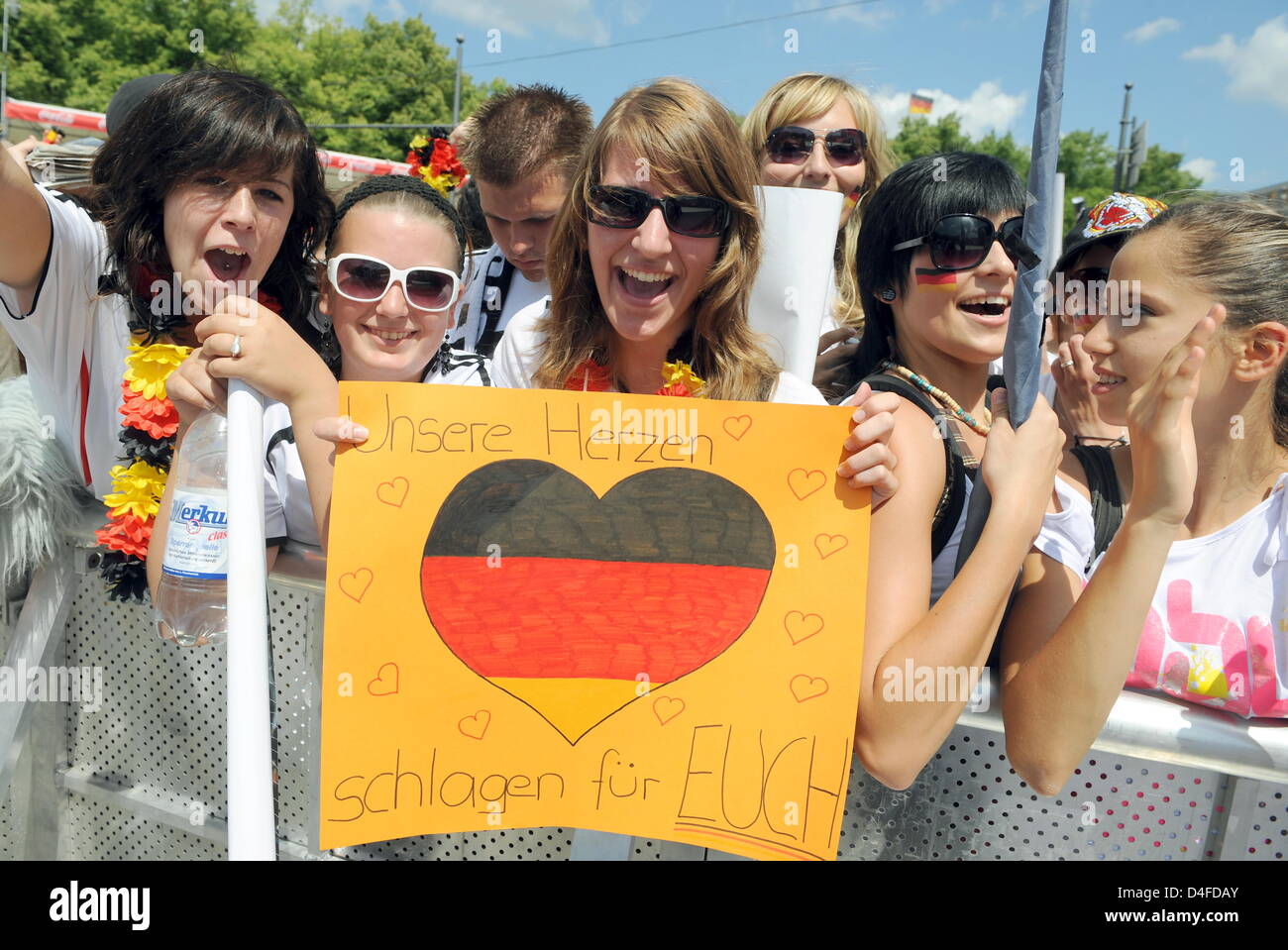 German soccer fans celebrate on the streets near Brandenburg Gate in ...