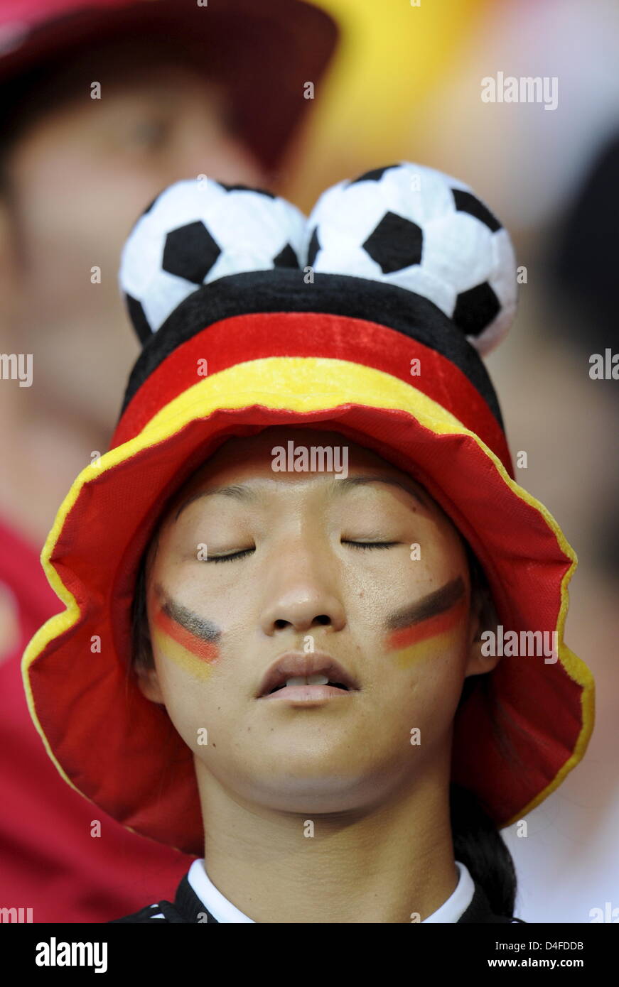 A fan of the German soccer team watches the UEFA EURO 2008 final match ...