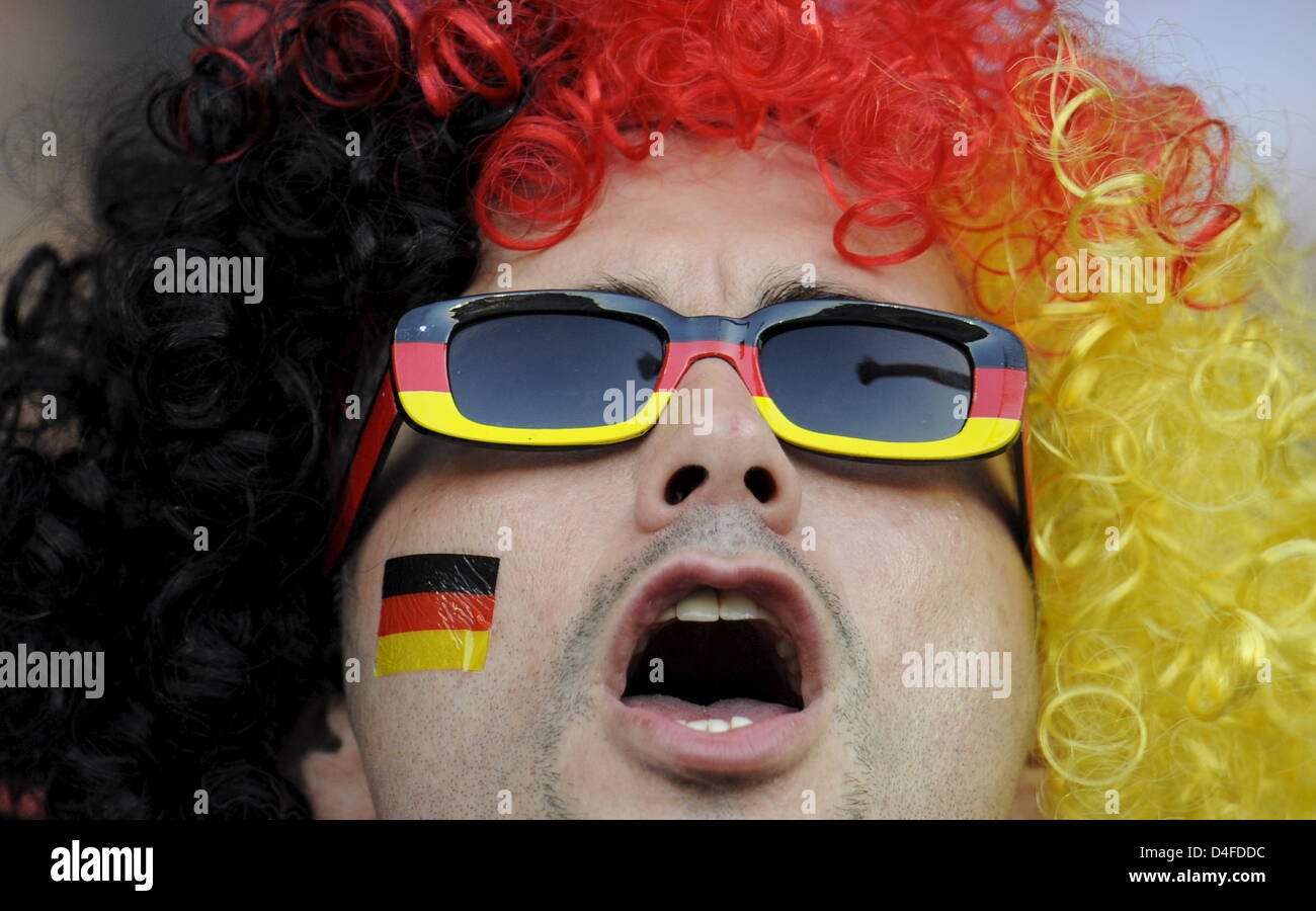 A fan of the German soccer team watches the UEFA EURO 2008 final match ...