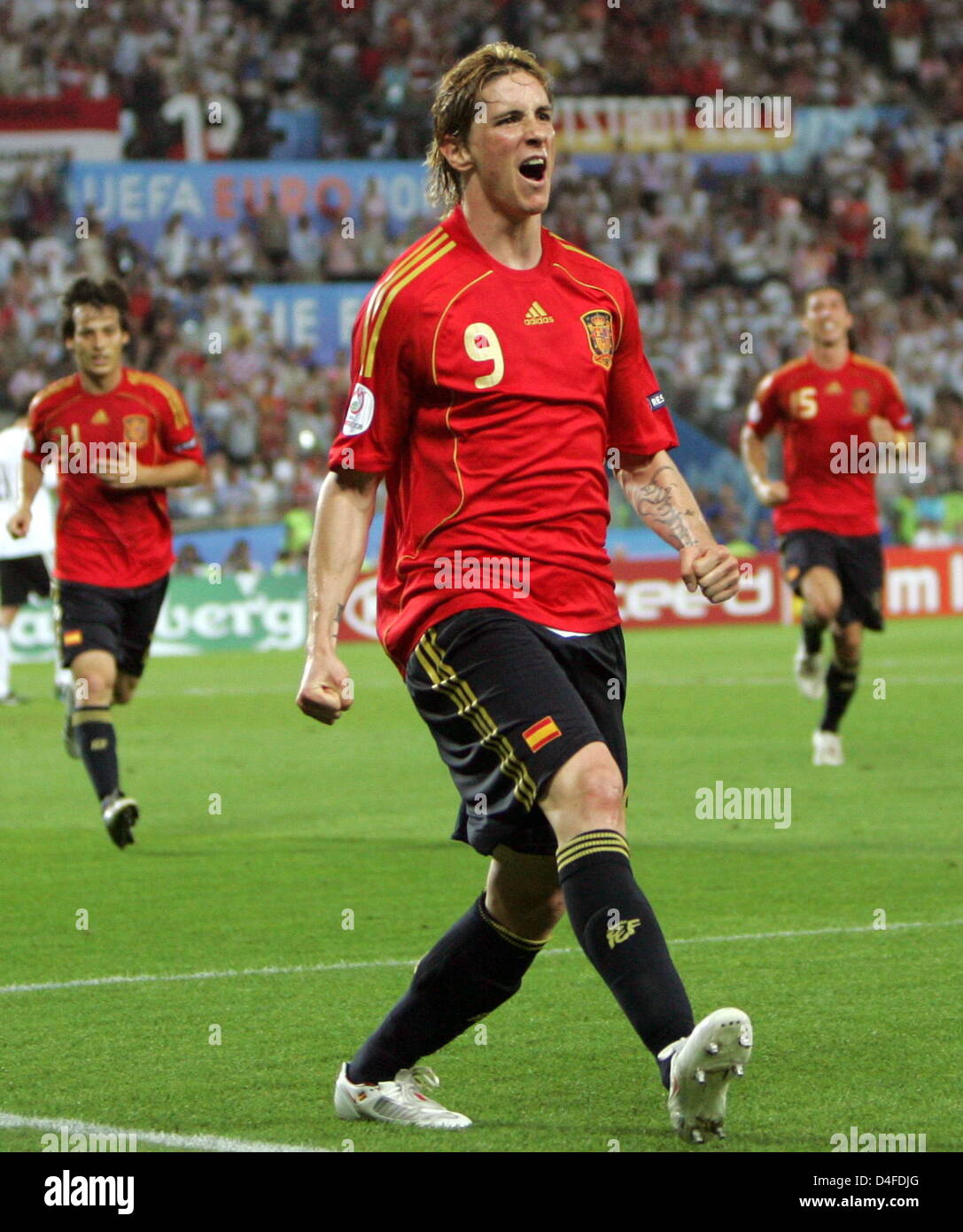 Fernando Torres of Spain celebrates after scoring the 1-0 lead during ...