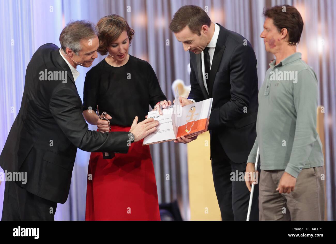 Actor Hannes Jaenicke (L-R), award-winner Ellen Schweizer, presenter ...