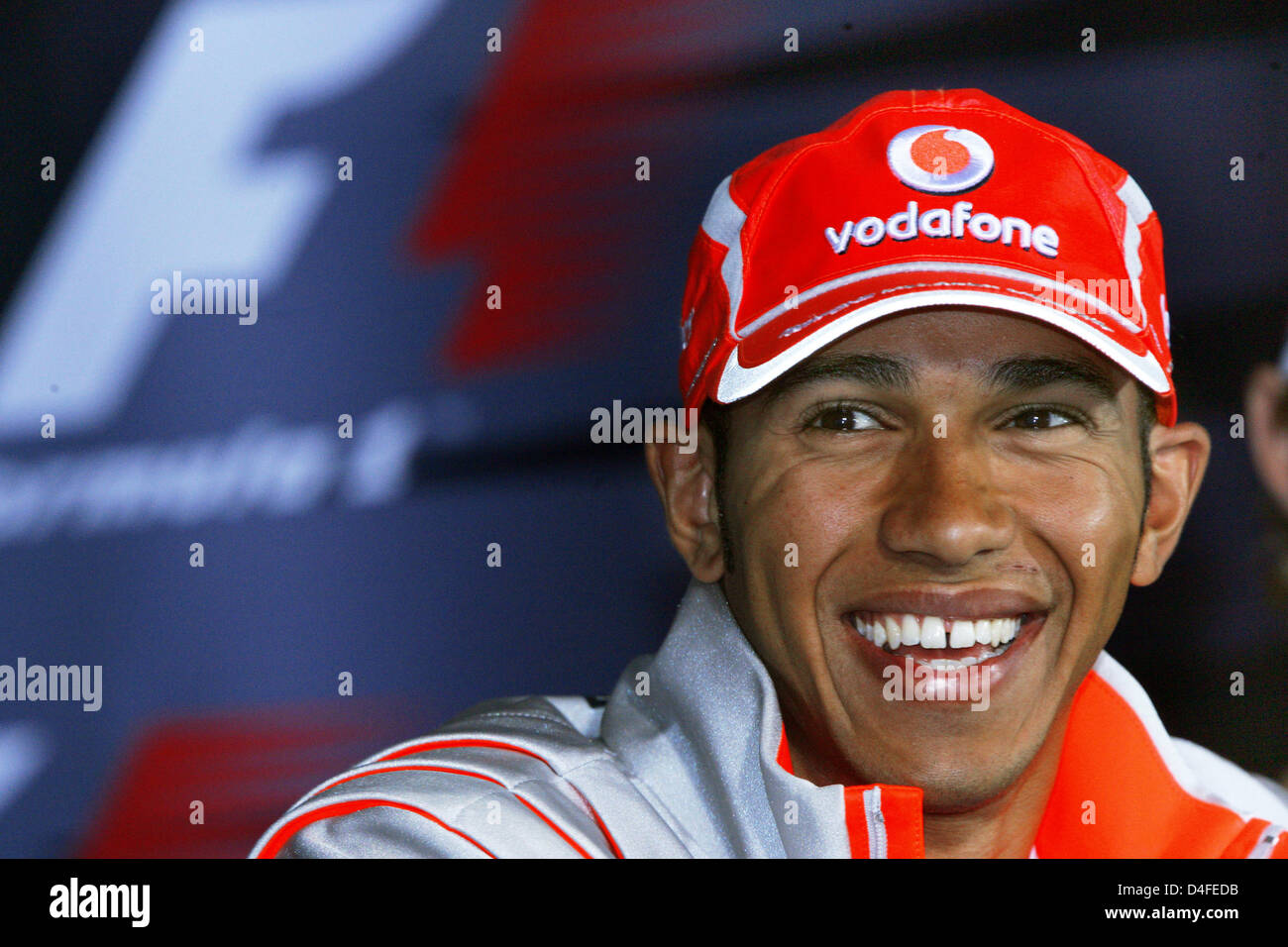 British Formula One driver Lewis Hamilton of McLaren Mercedes smiles ...
