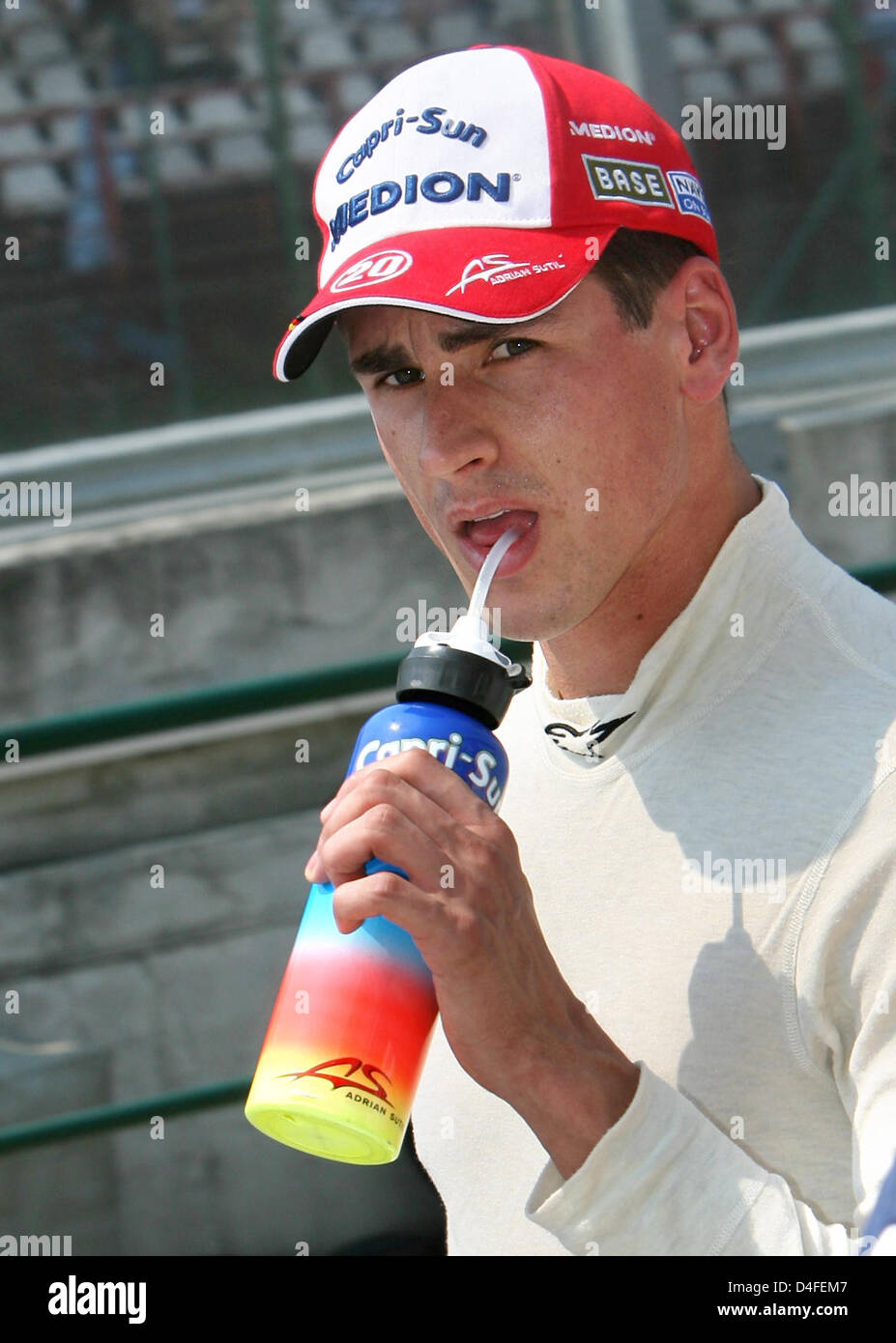 German Formula One driver Adrian Sutil of Force India walks through the ...