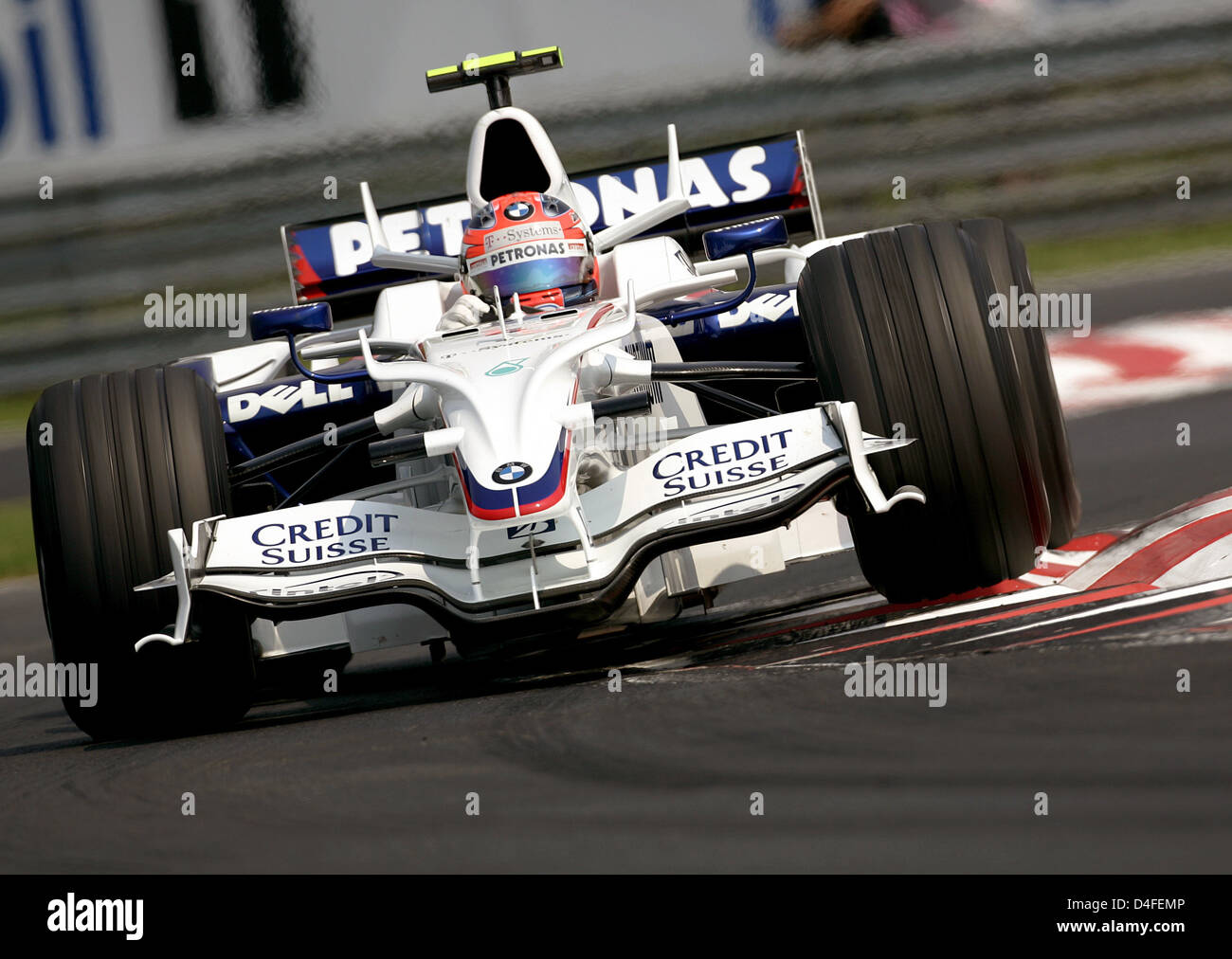 Polish Formula One driver Robert Kubica of BMW Sauber steers his car to ...