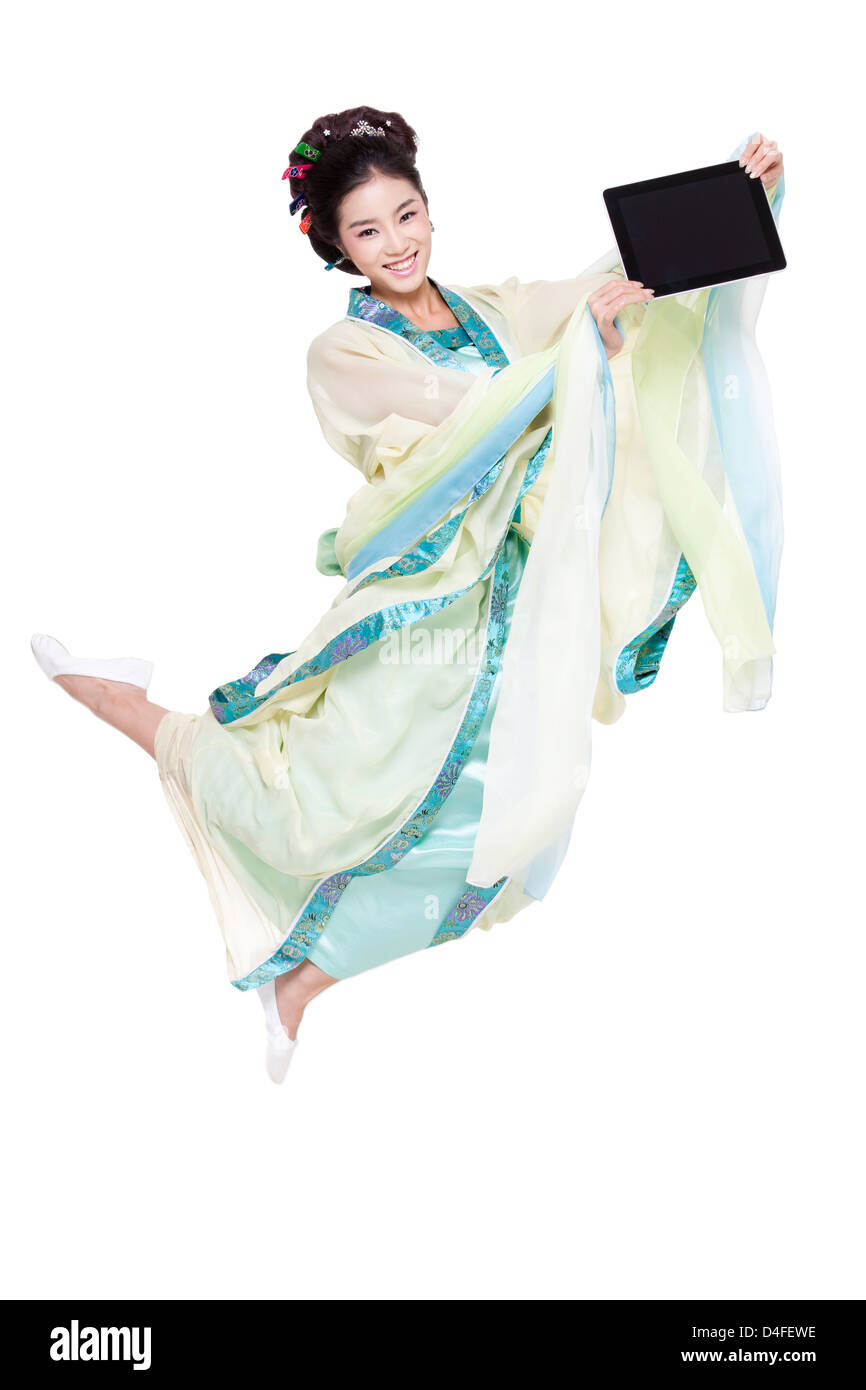 Young woman in Chinese traditional costume and digital tablet Stock ...
