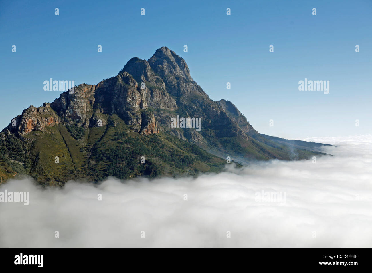 Mountain peak above clouds hi-res stock photography and images - Alamy