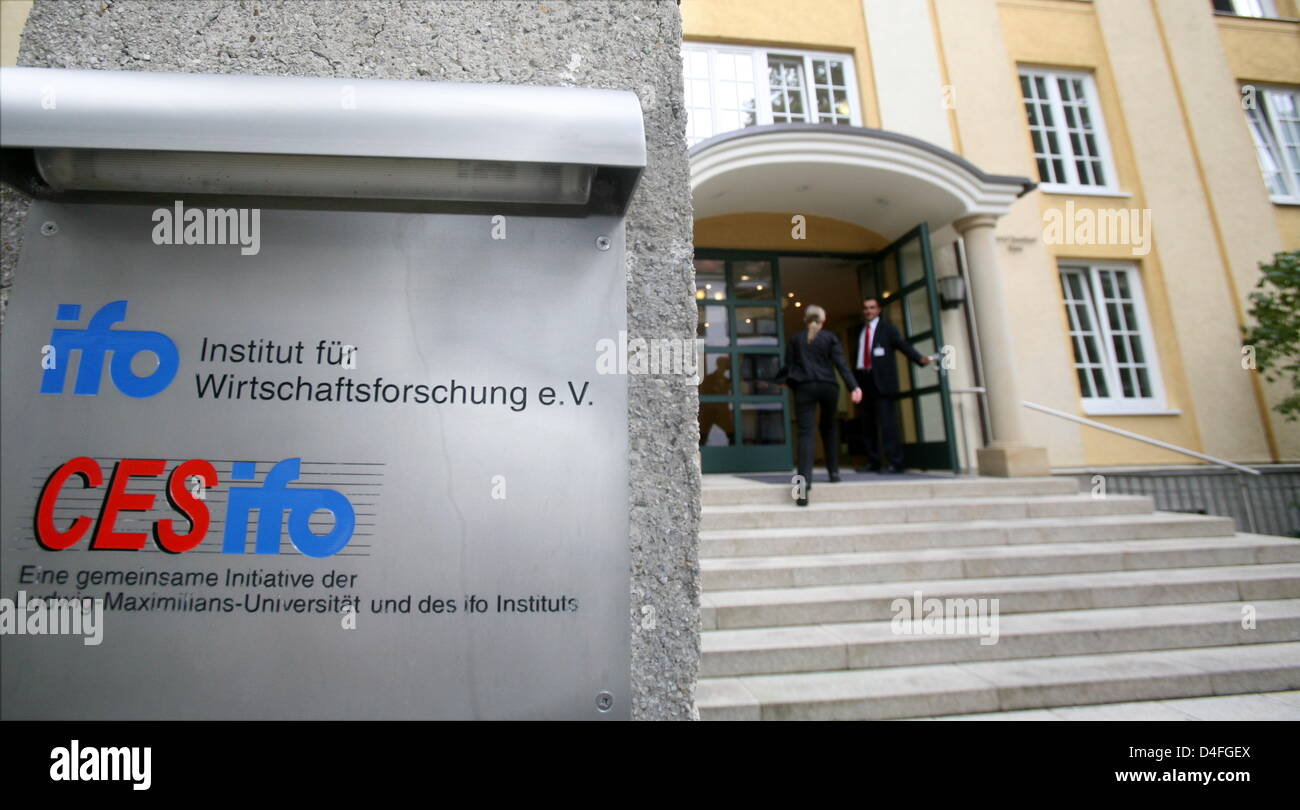A woman enters the Ifo Institute for Economic Research at the ...