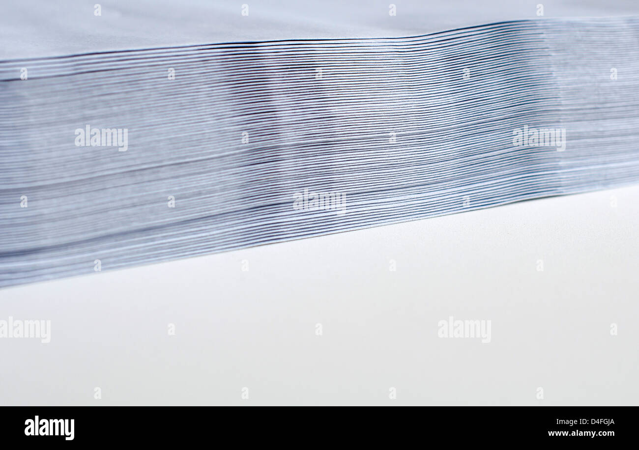 Stack of envelopes on white background Stock Photo - Alamy