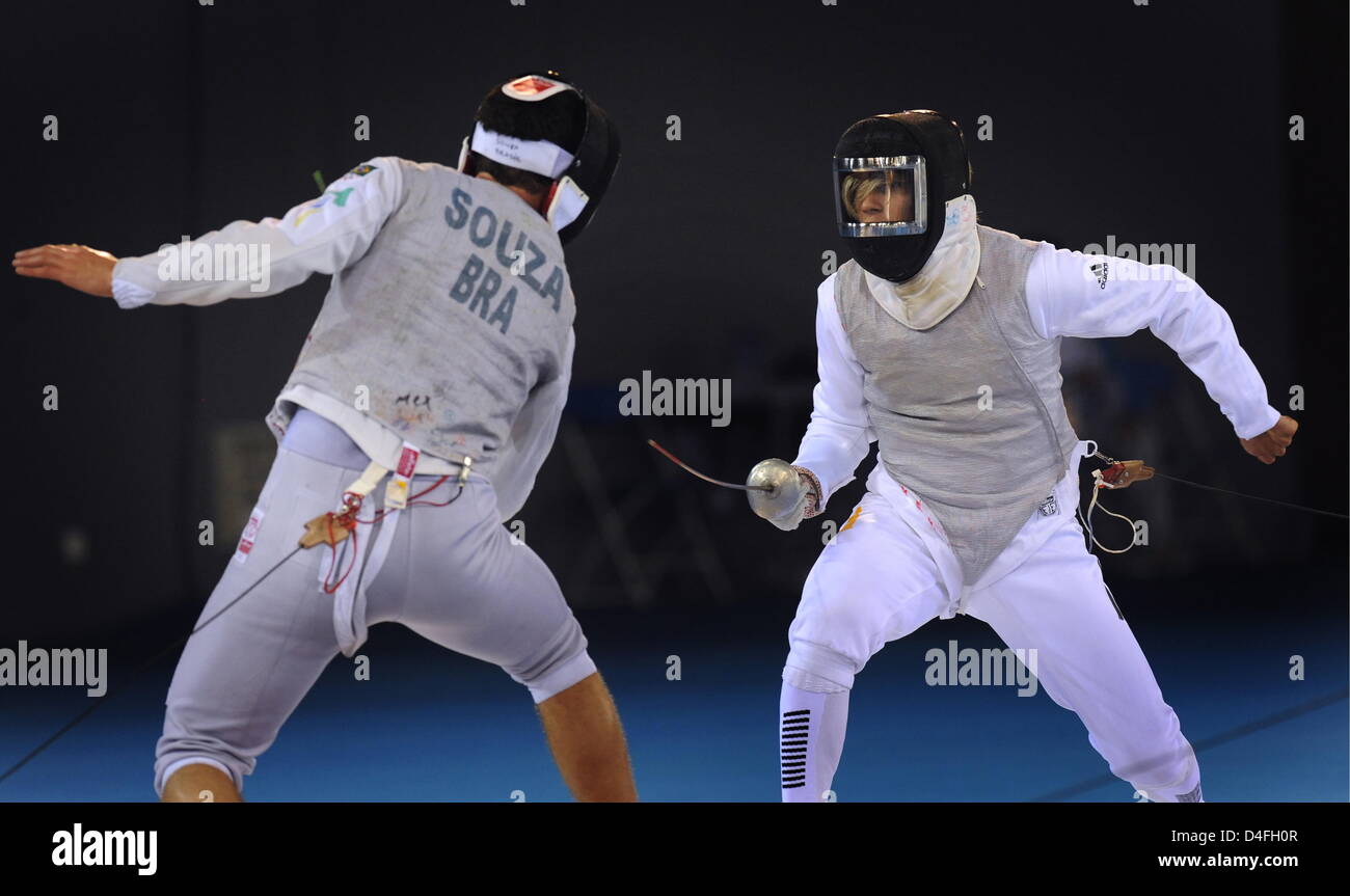 German fencer Peter Joppich (R) fights against Brazilian Joao Antonio ...