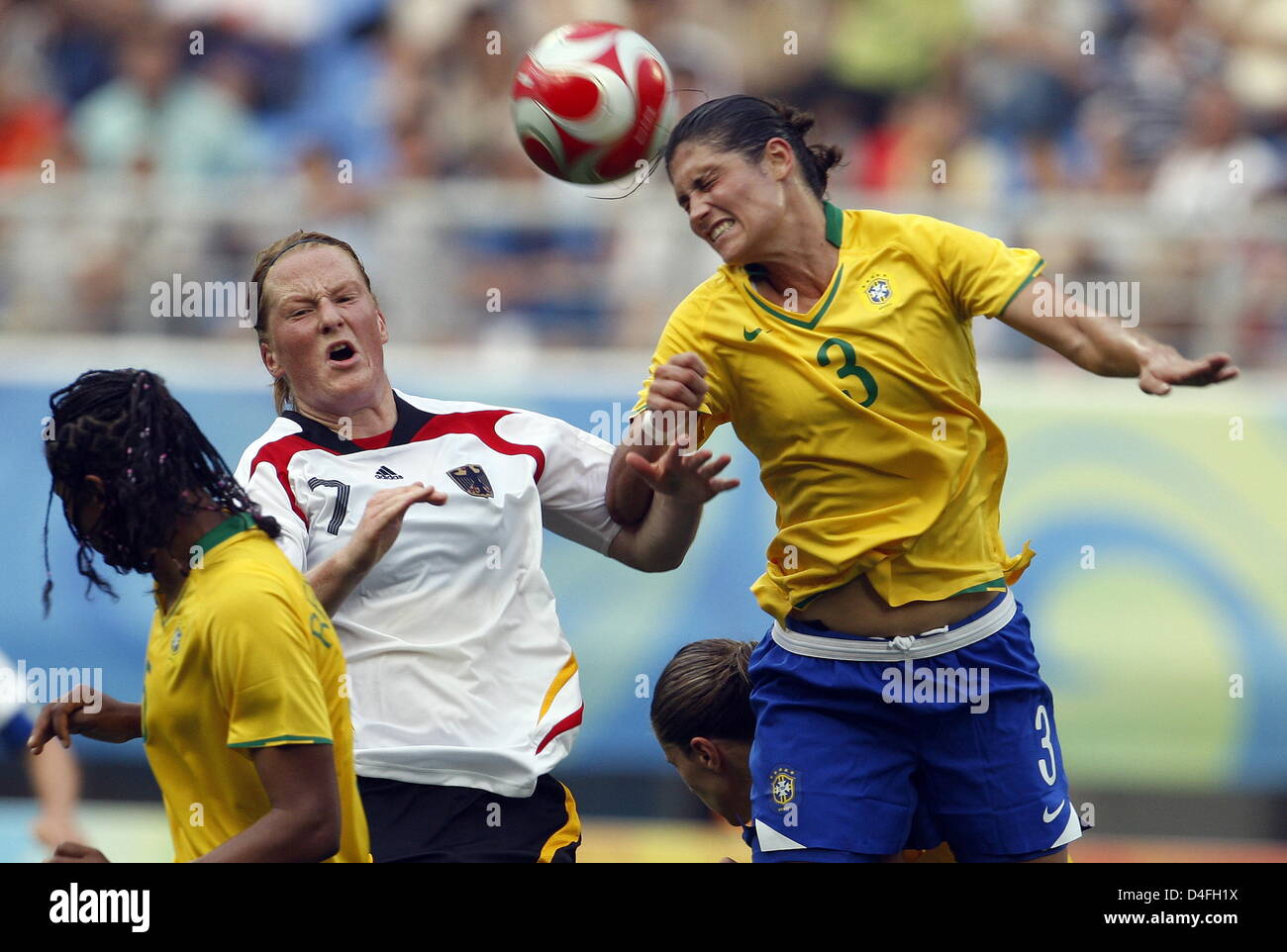 Melanie Behringer (C) of Germany vies with Rosa Andreia (R) of Brasil ...