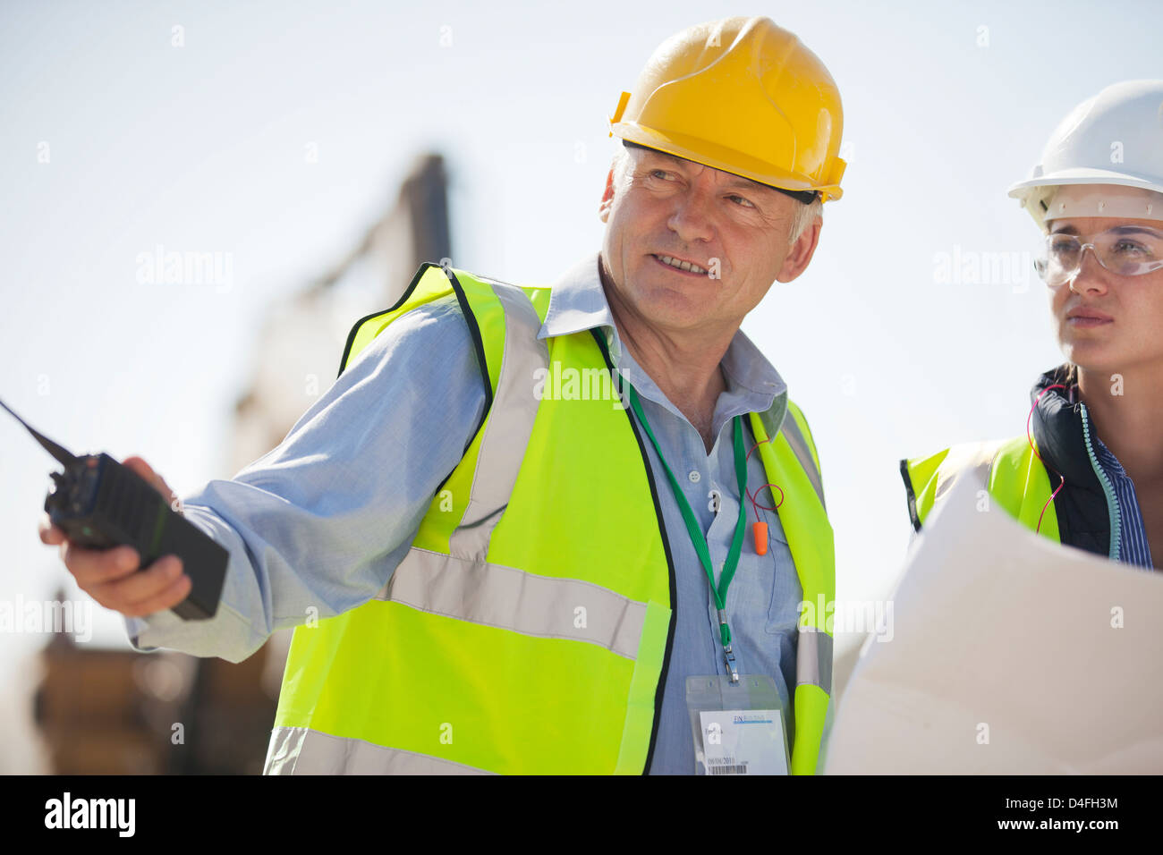 Two business man safety hats hi-res stock photography and images - Alamy
