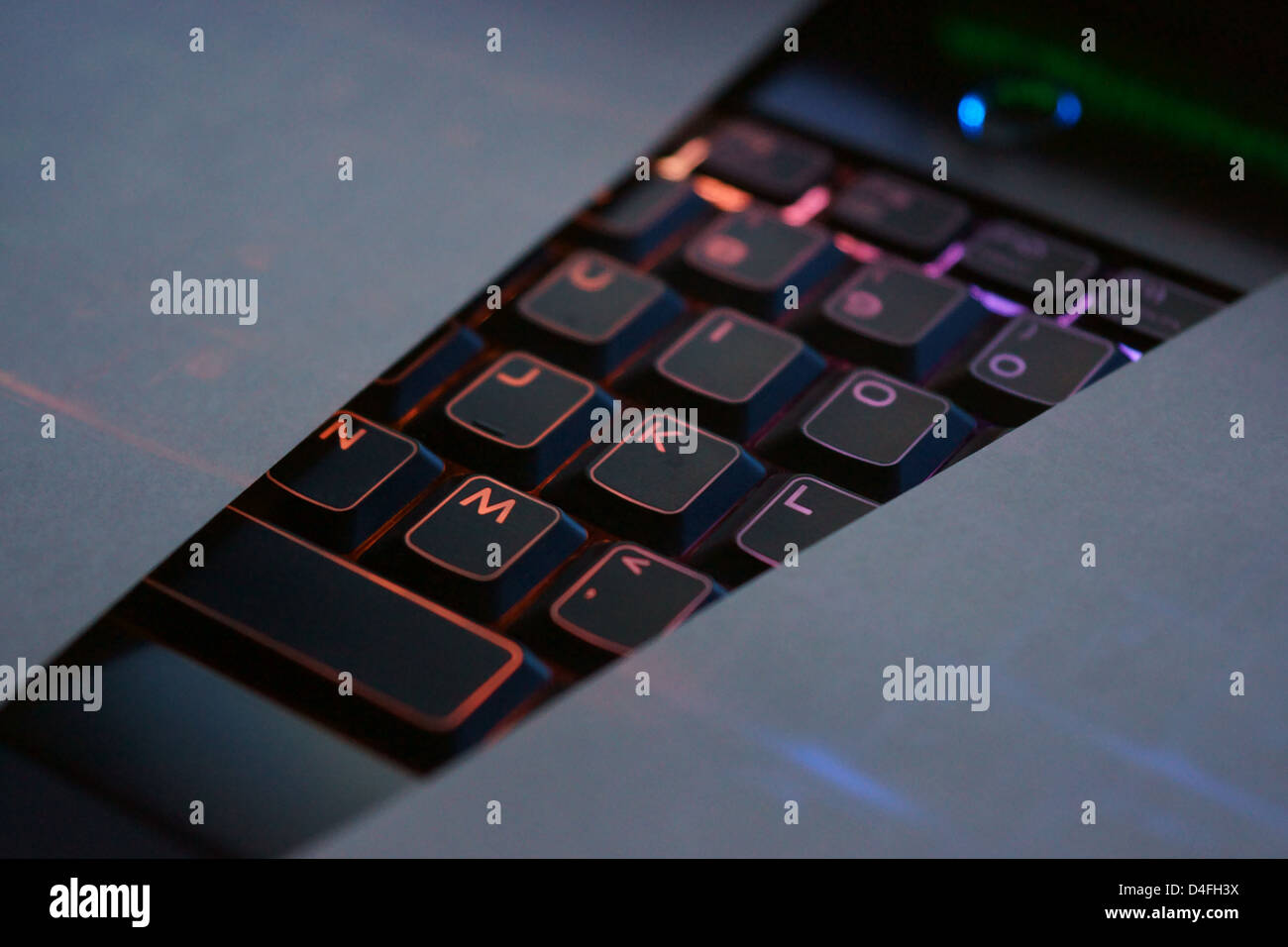 Glowing many colors keyboard blue green purple Stock Photo - Alamy